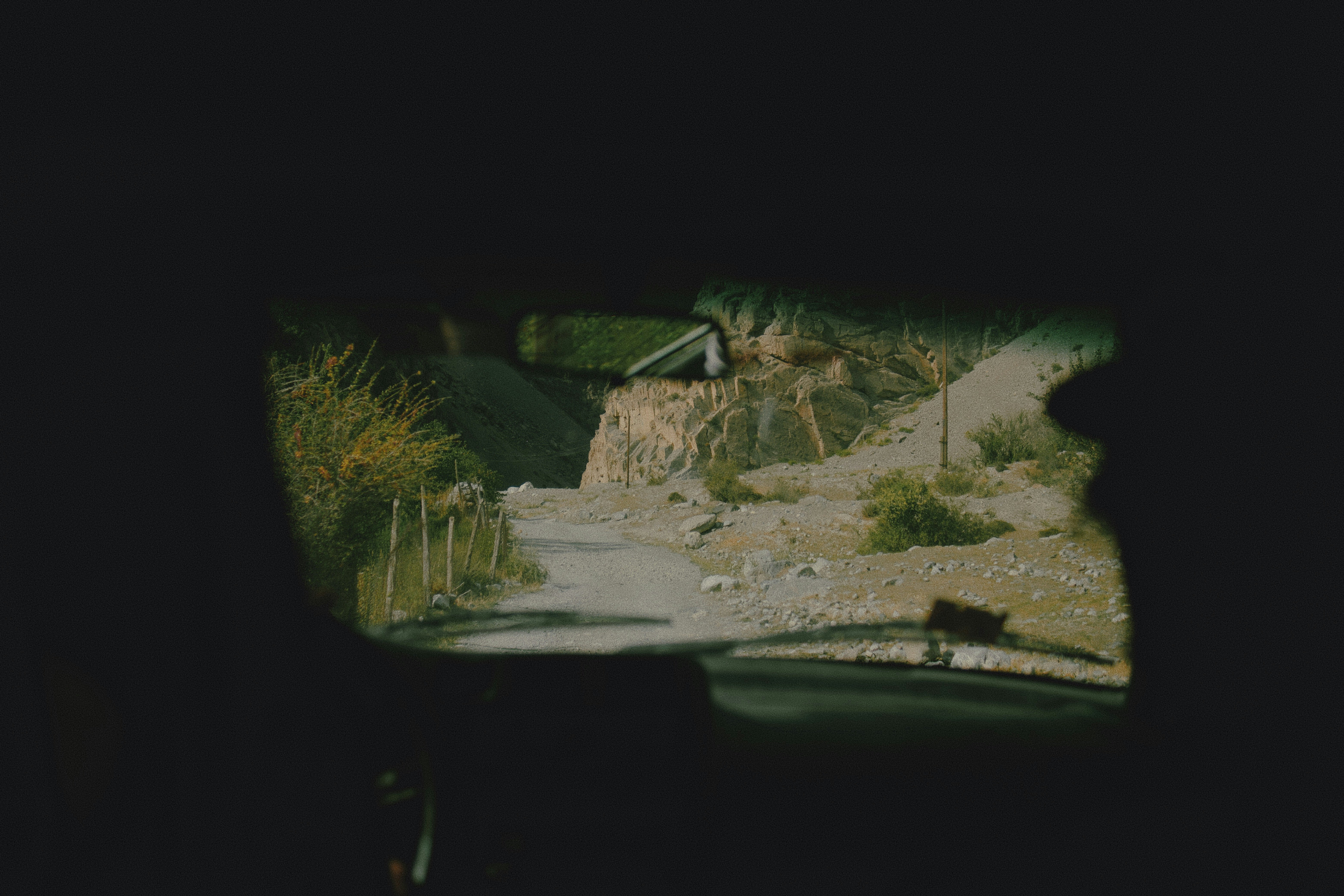 Light at the Tunnel: A Narrow View Through the Back Seat Window