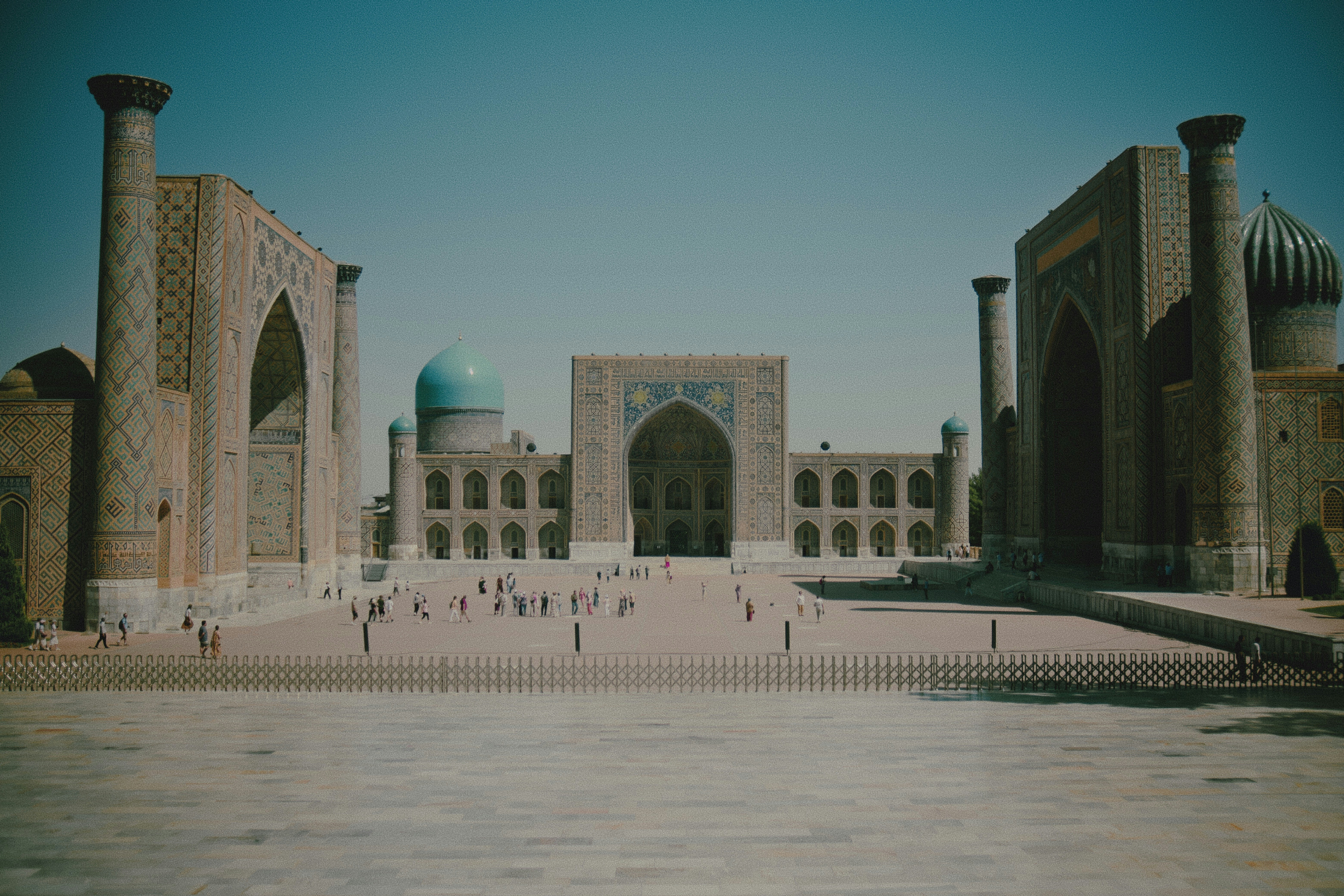 Gateways of Marble: A Grand Complex Under a Clear Desert Sky