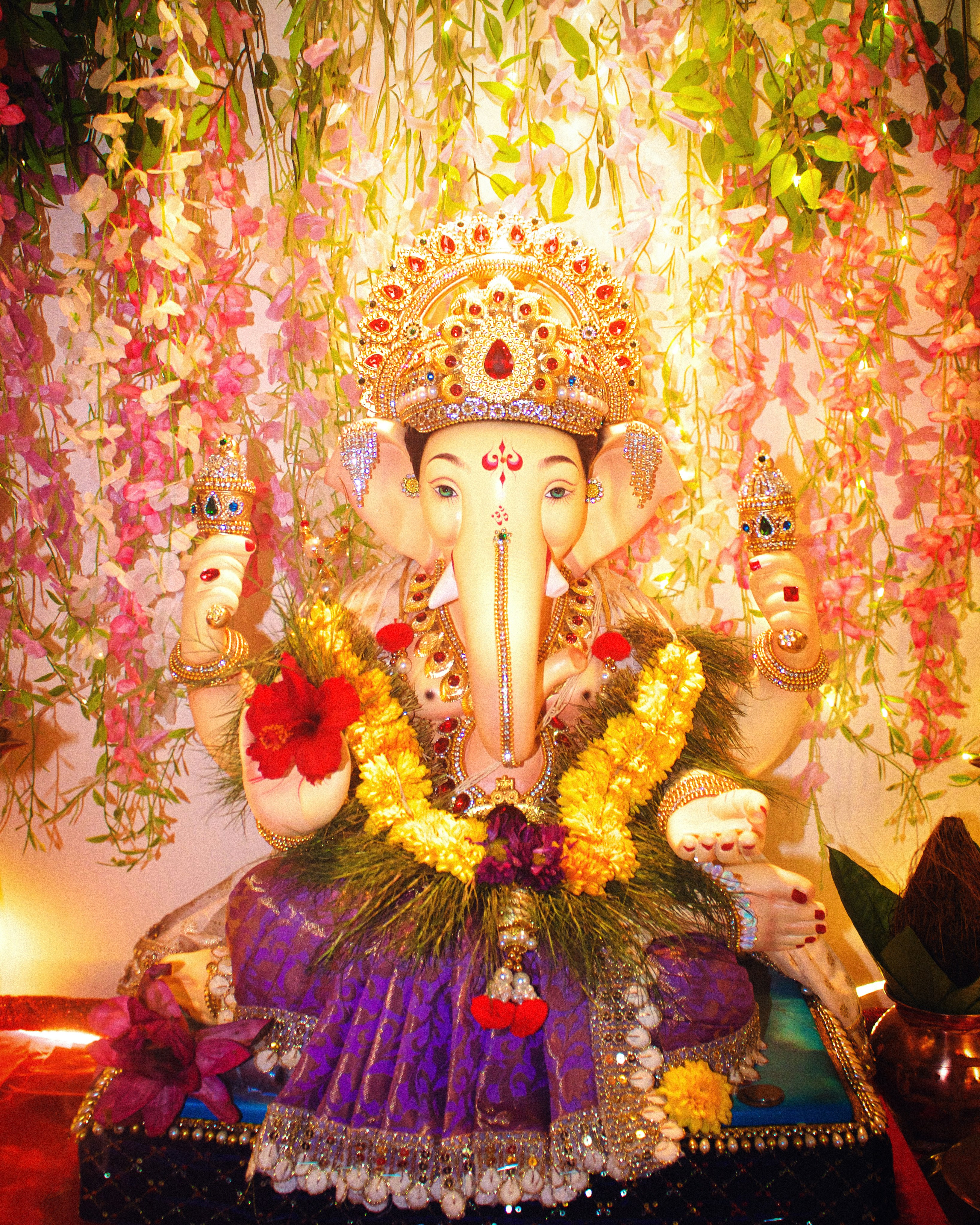 The Luminescent Ganesh Shrine Adorned in Floral Grace