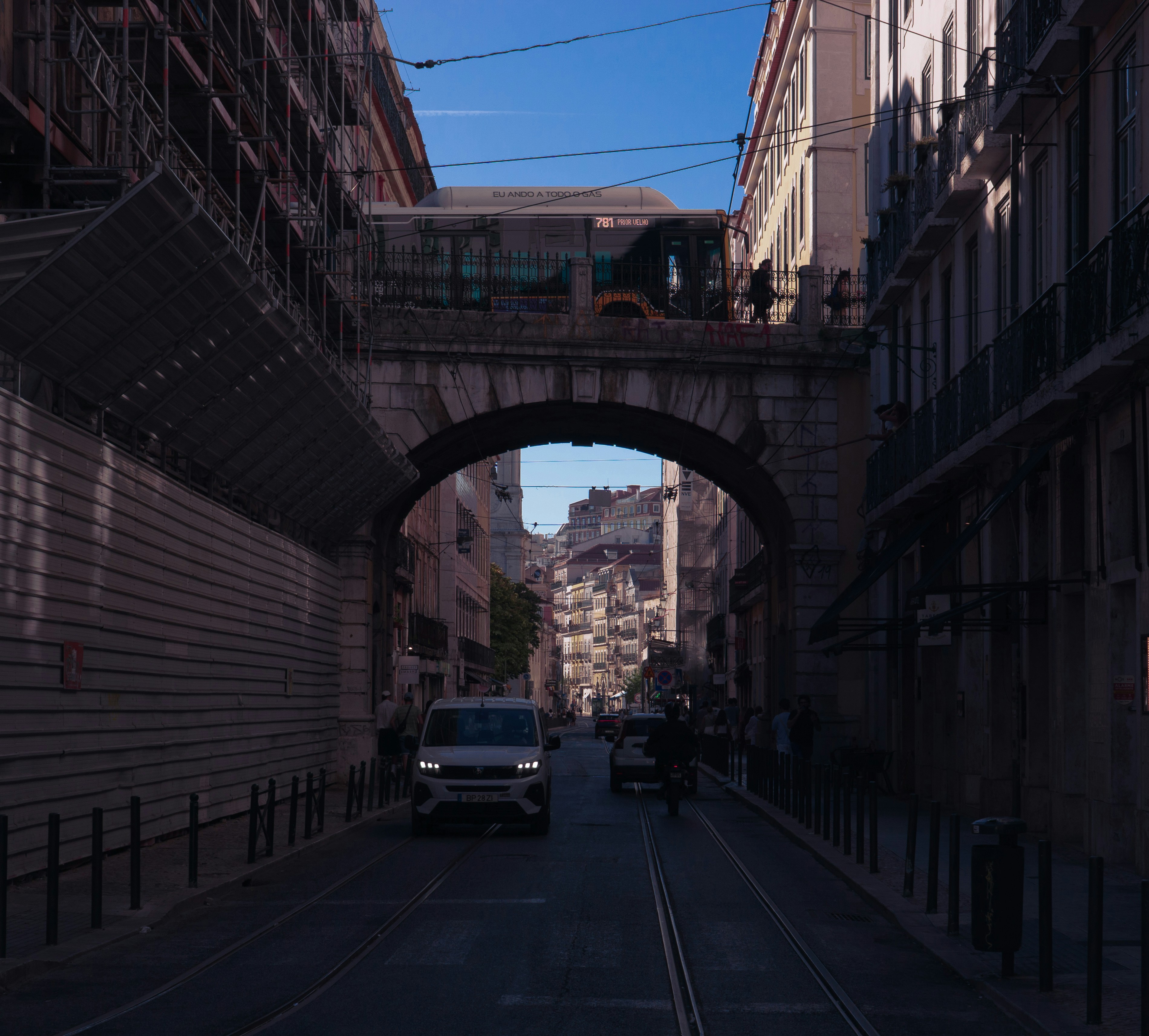 Under the Arch: City Rail Cut Through Stone and Sky