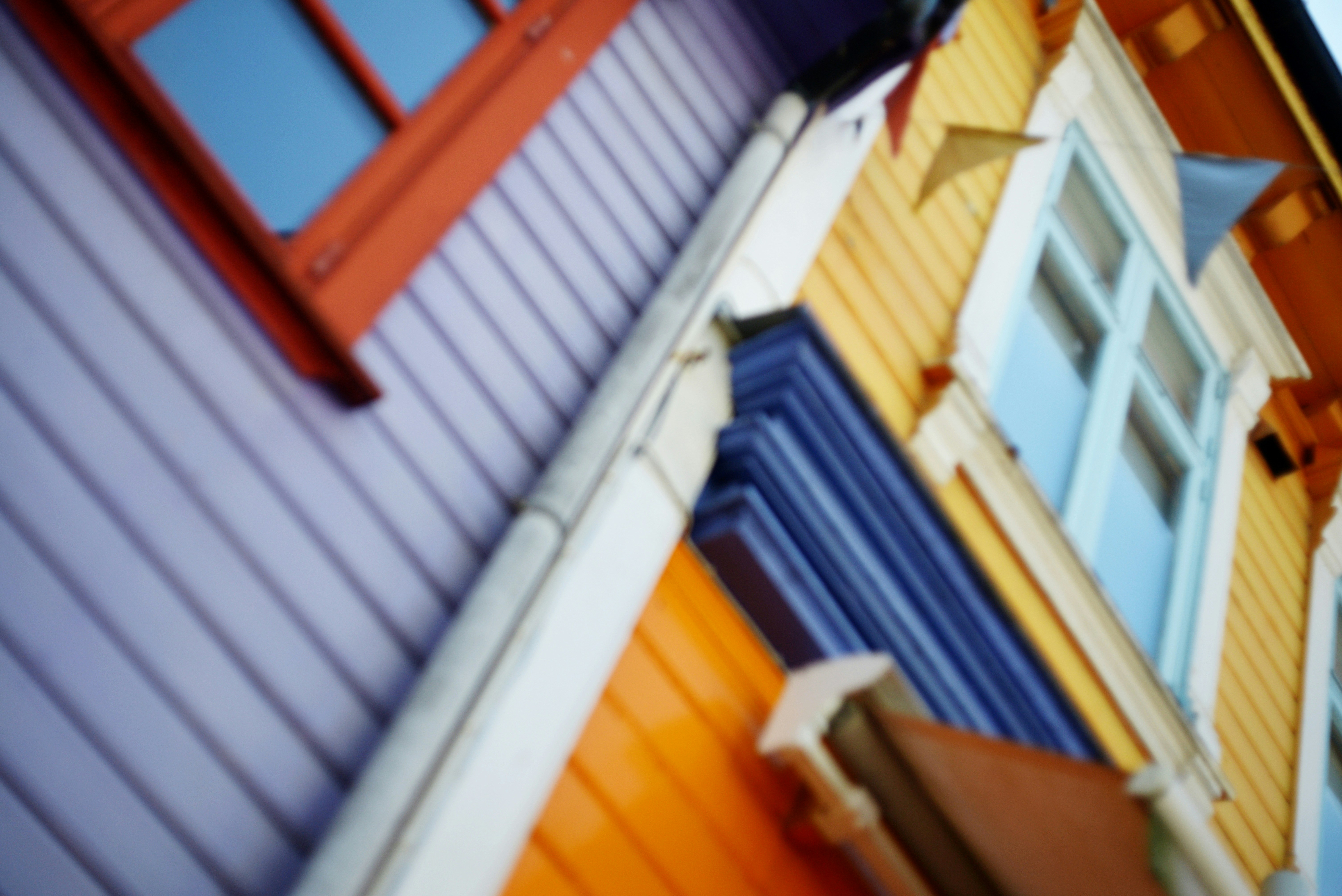Vibrant Row of Painted Facades Tilted Toward the Sun
