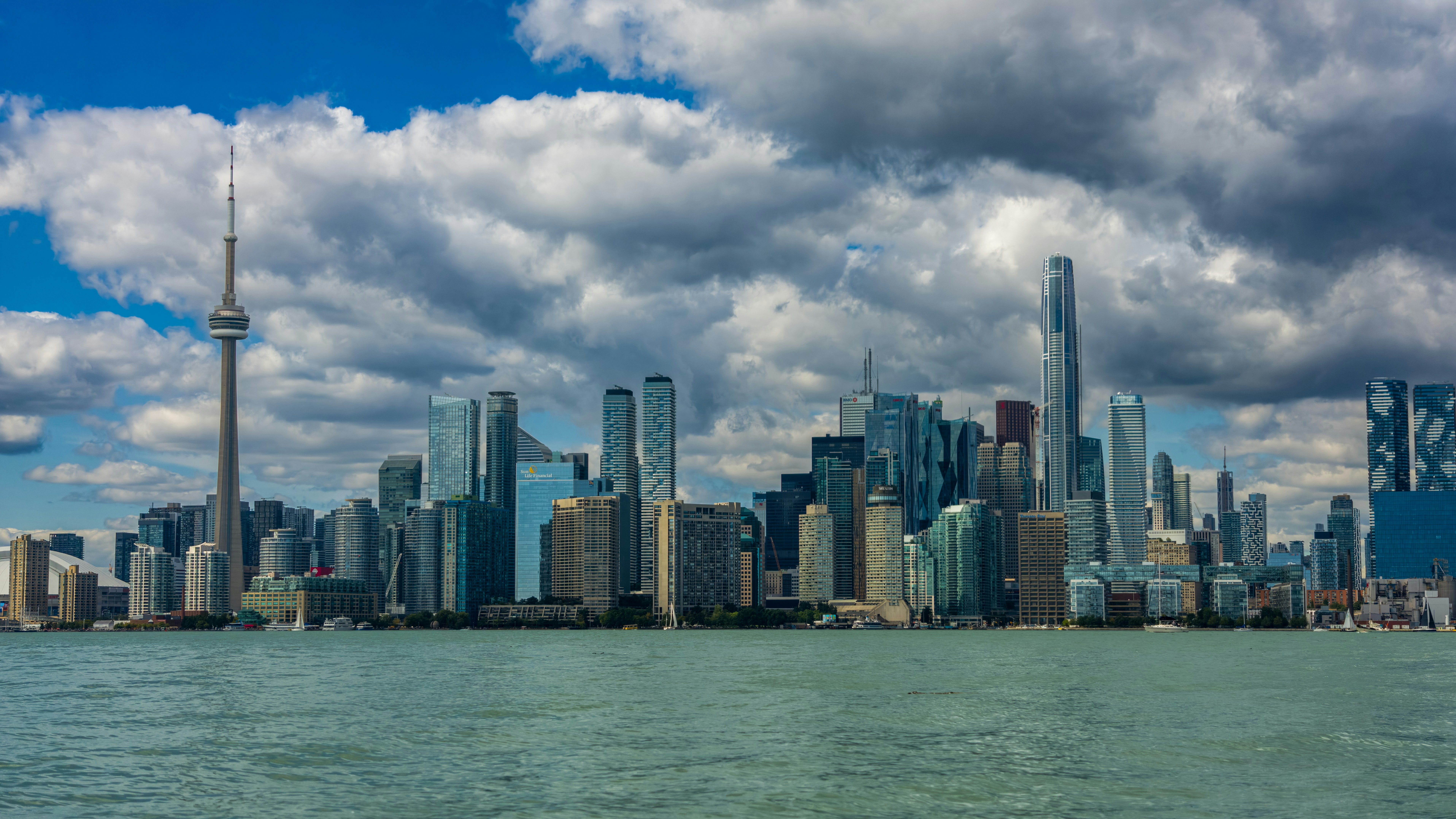 Urban Horizon: Skyline Silhouette Over Choppy Harborscape