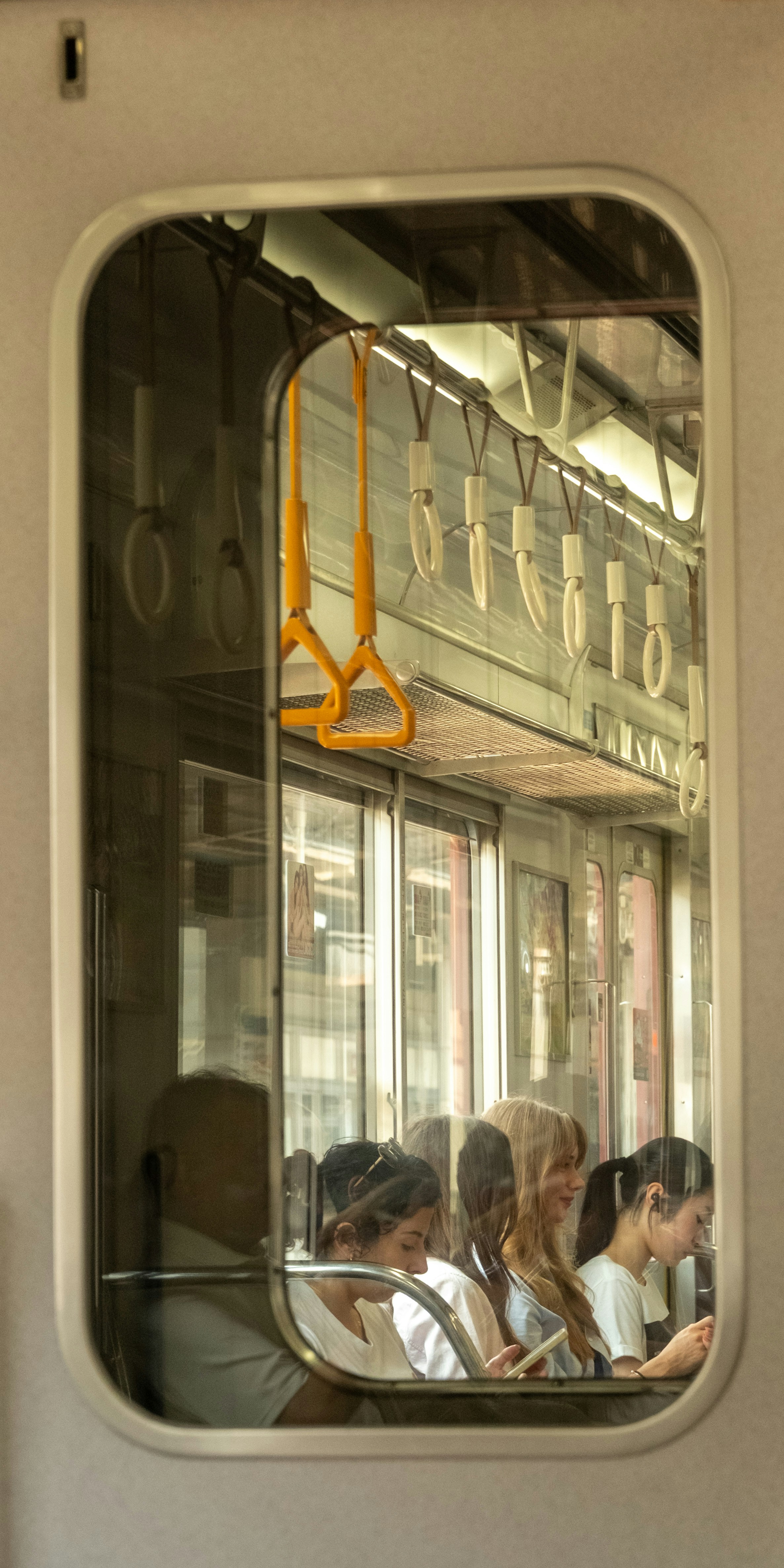 Inside a Commuter Car: Hanging Straps and Sleeper-Soft Echoes
