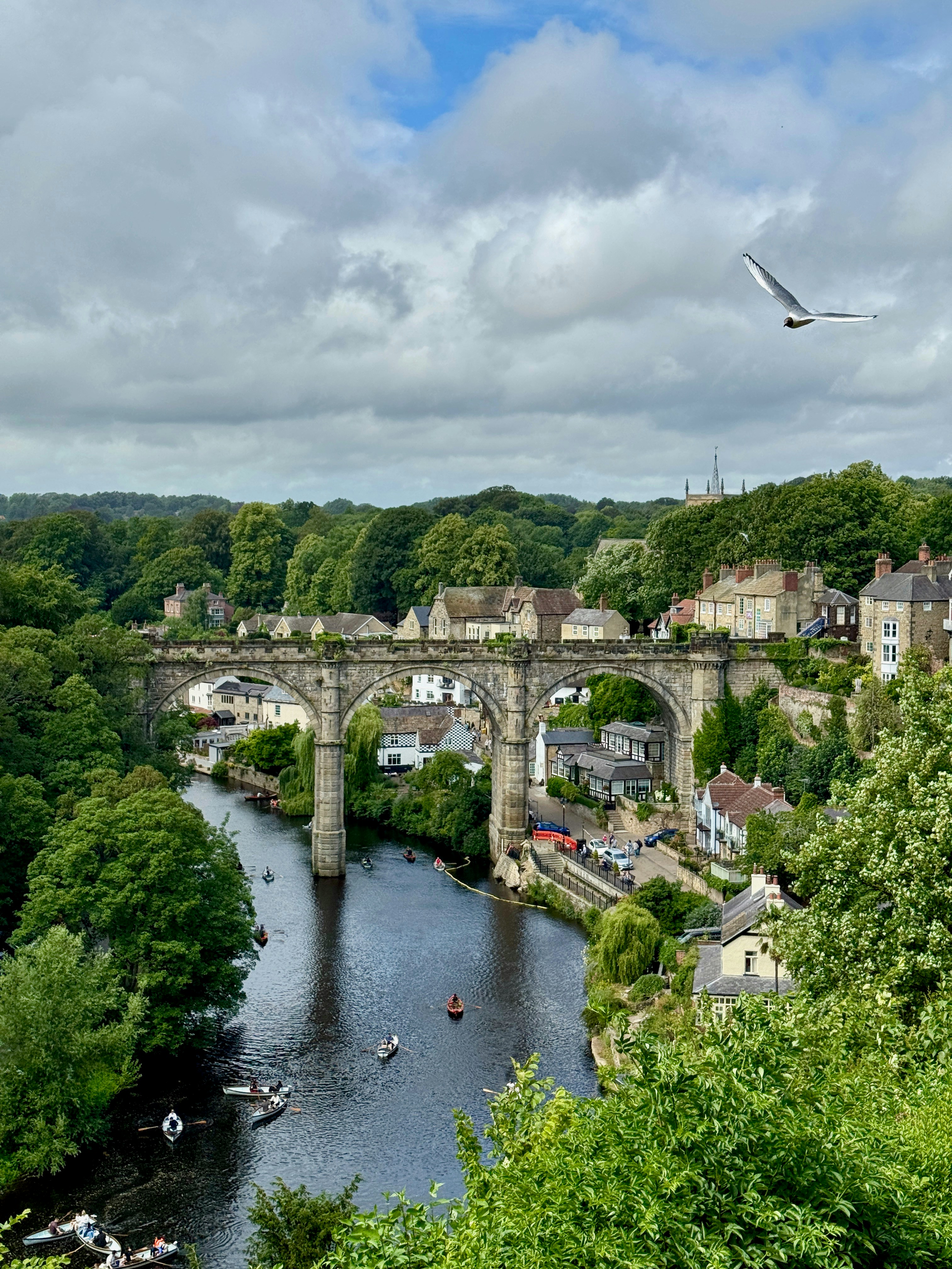 Stone Archway Over the River: A Village Snapshot from the Viaduct