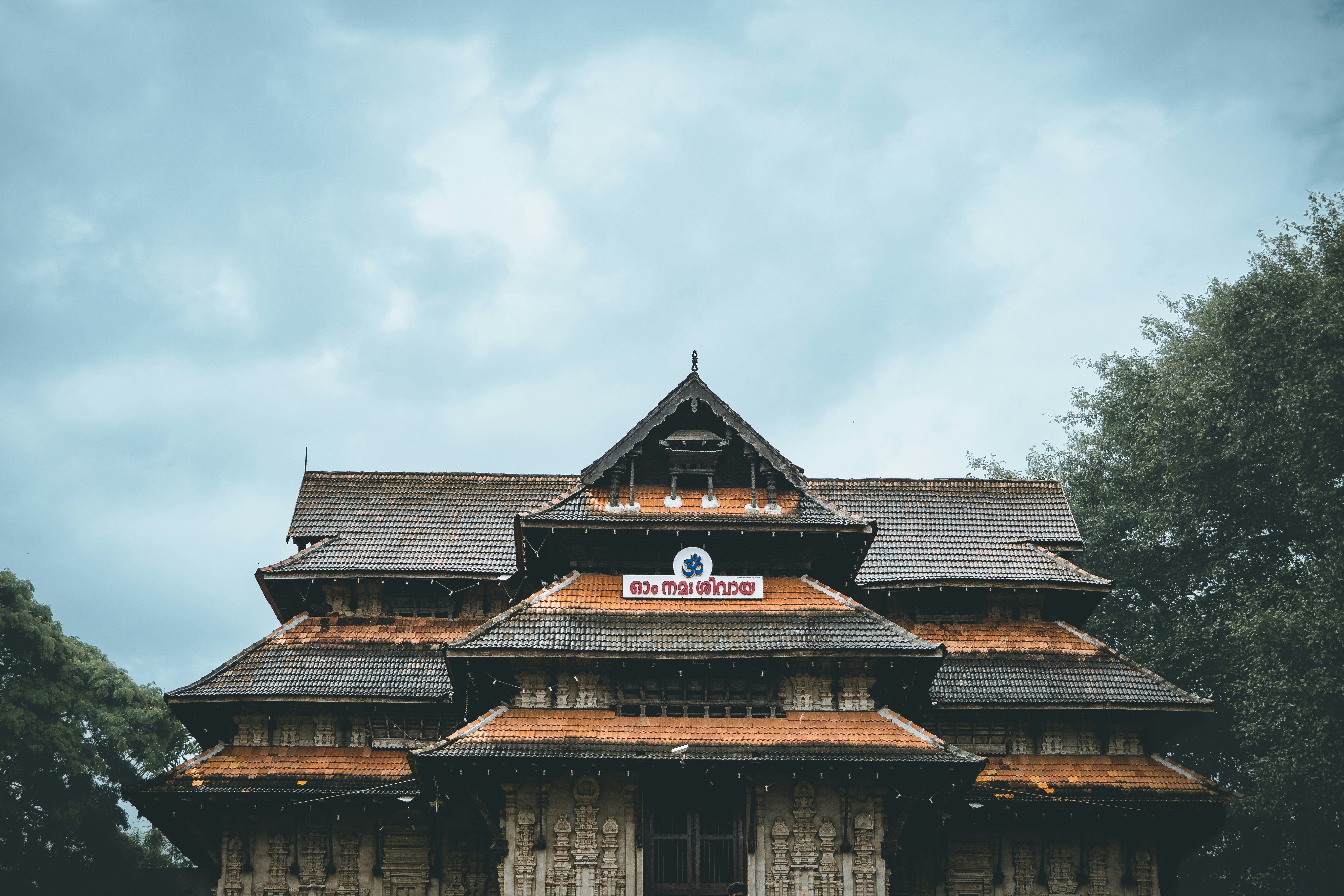 Temple Gables in Twilight: A Multi-Tiered Roof of Quiet Resolve