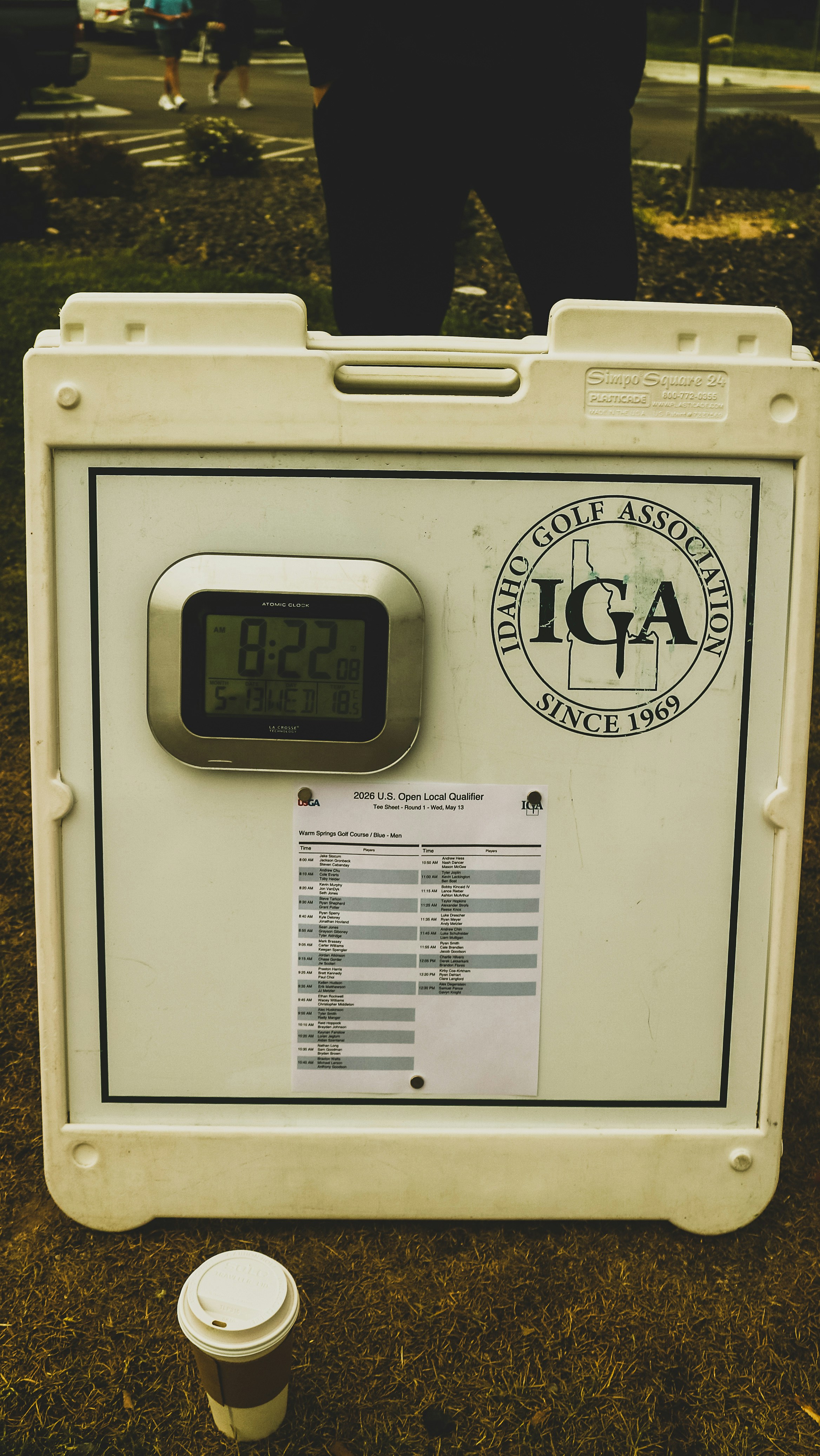 Silent Clock, Public Park: IGA Signage and a Coffee Cup