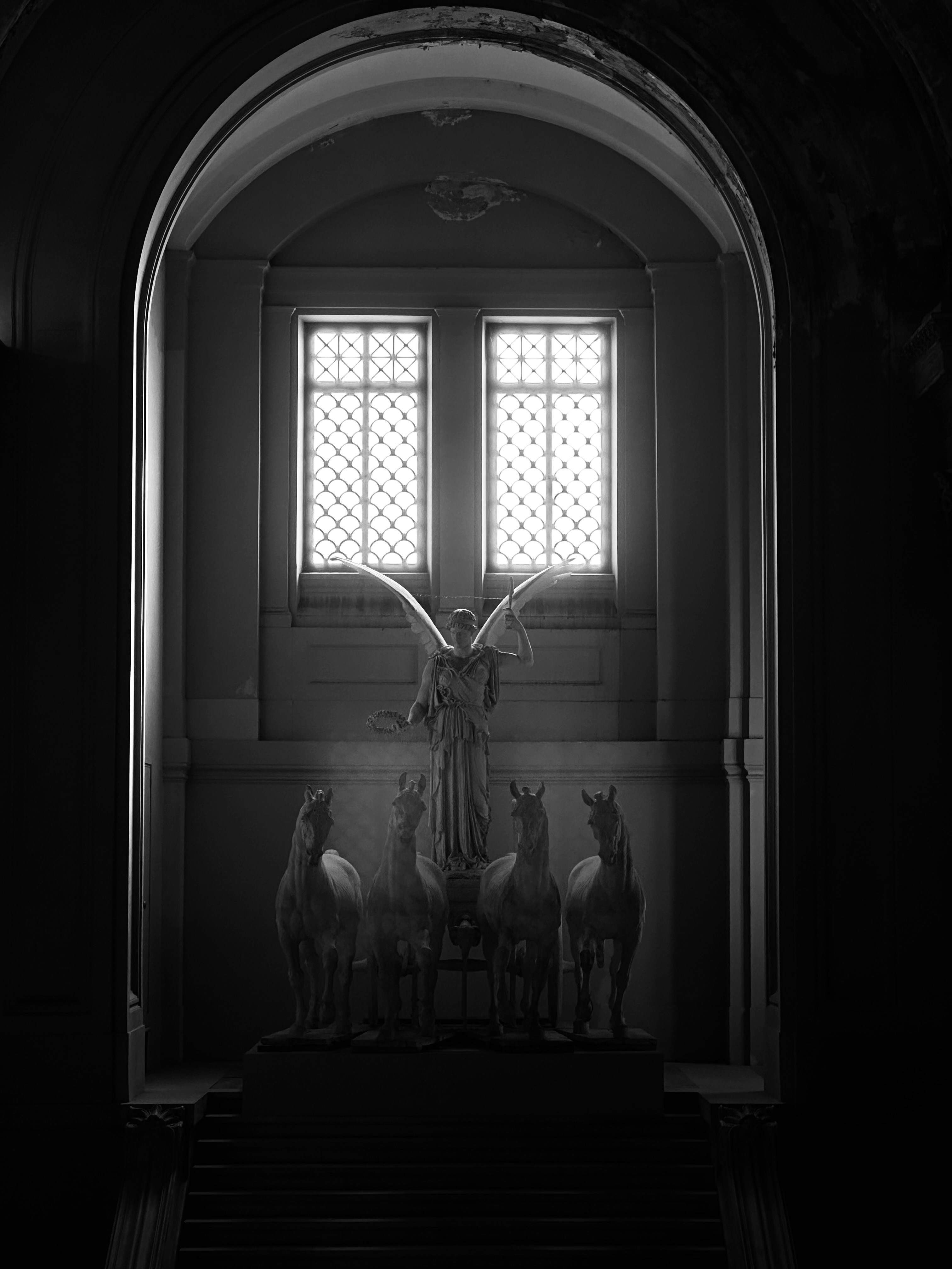 Angel in the Atrium: A Gothic Shrine of Horses and Light