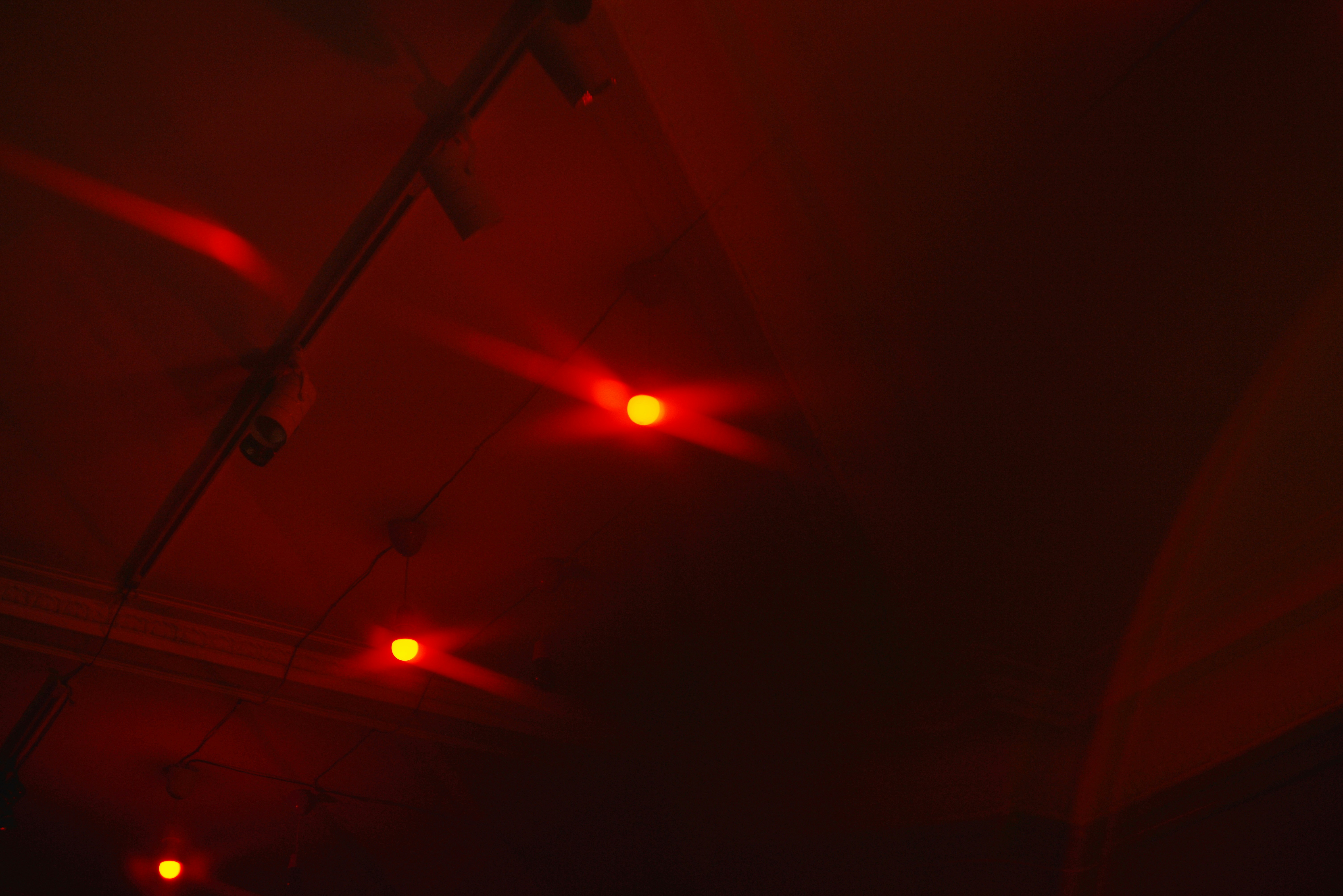Red Neon Rails: A Low-Light Gallery of Circuits and Light
