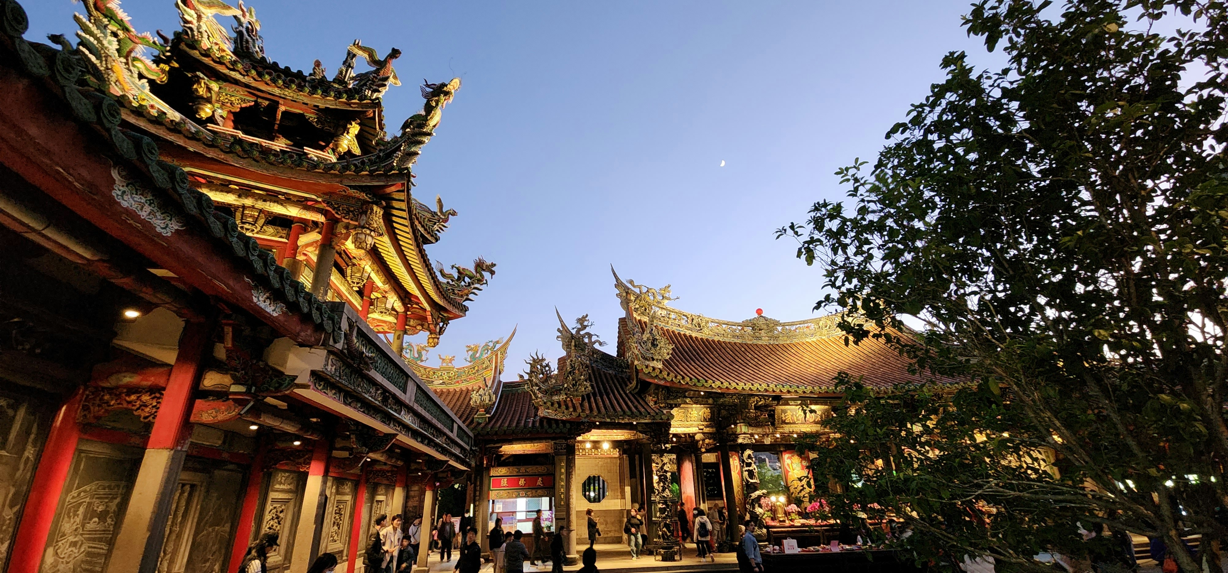 Golden Roofs Under a Clear Sky: A Temple Courtyard in Sunlight