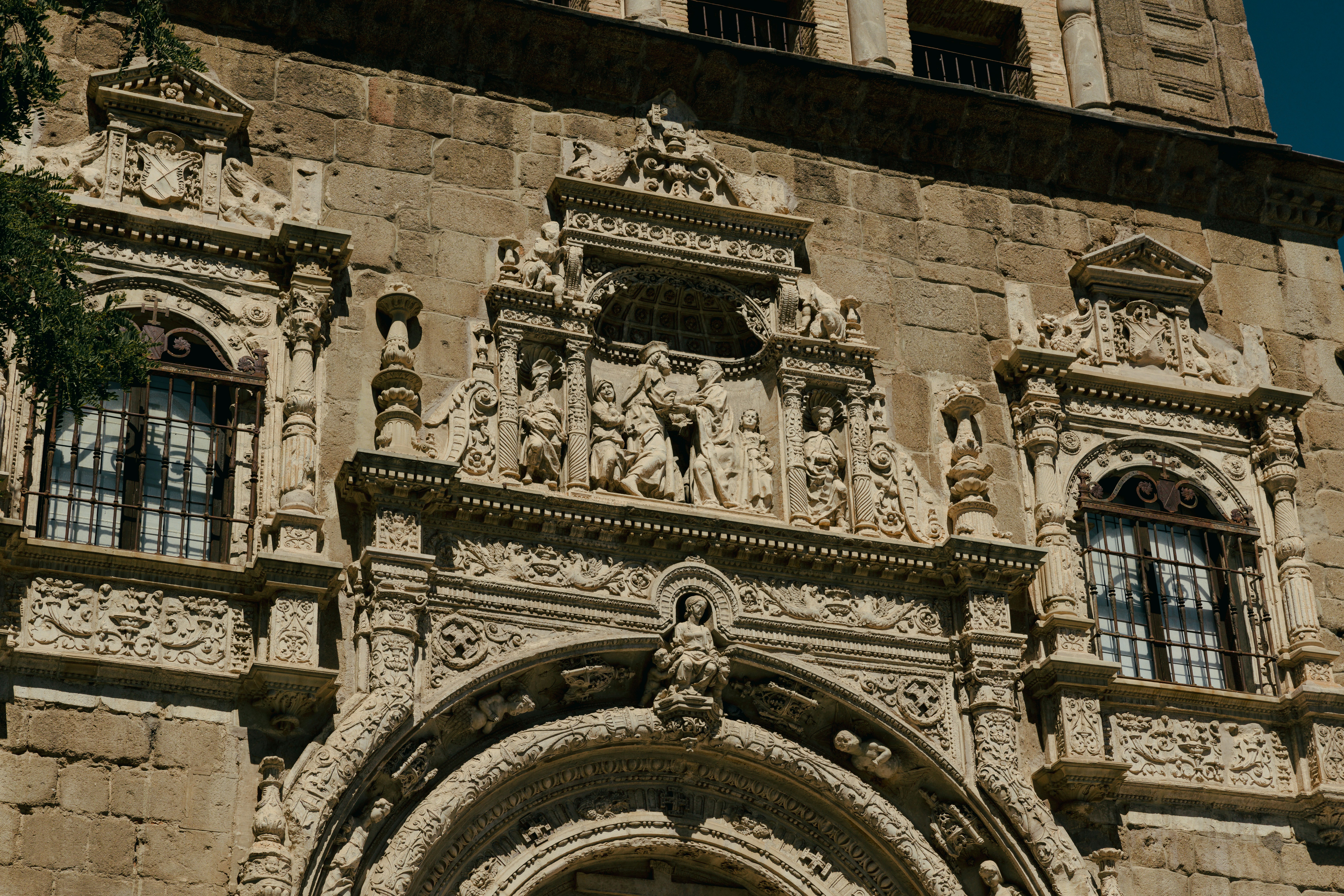 Carved Facade of Time: A Stone Archive of Ornate Archways