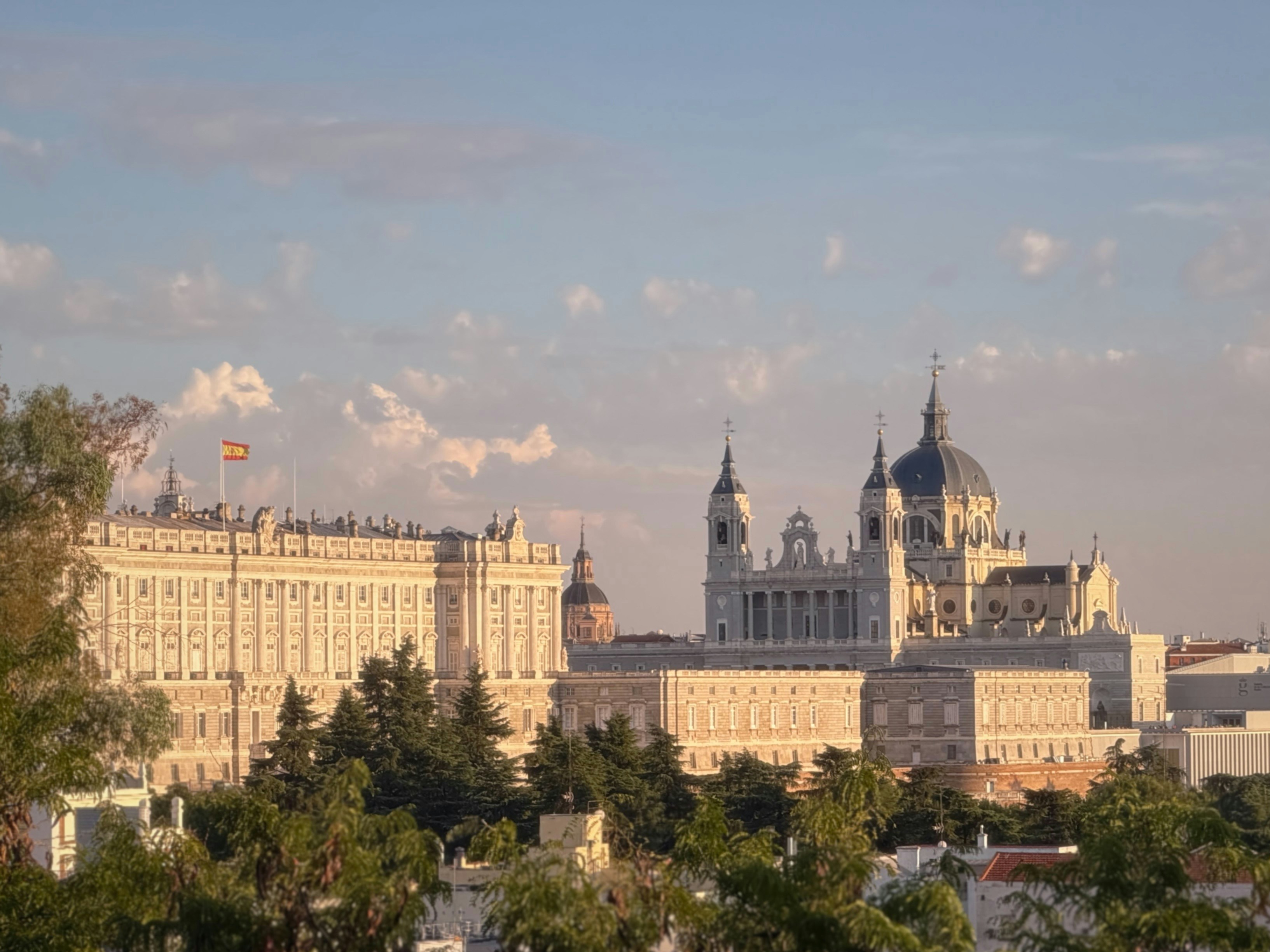 Madrid’s silhouette at golden hour: domed cathedral and stately facade