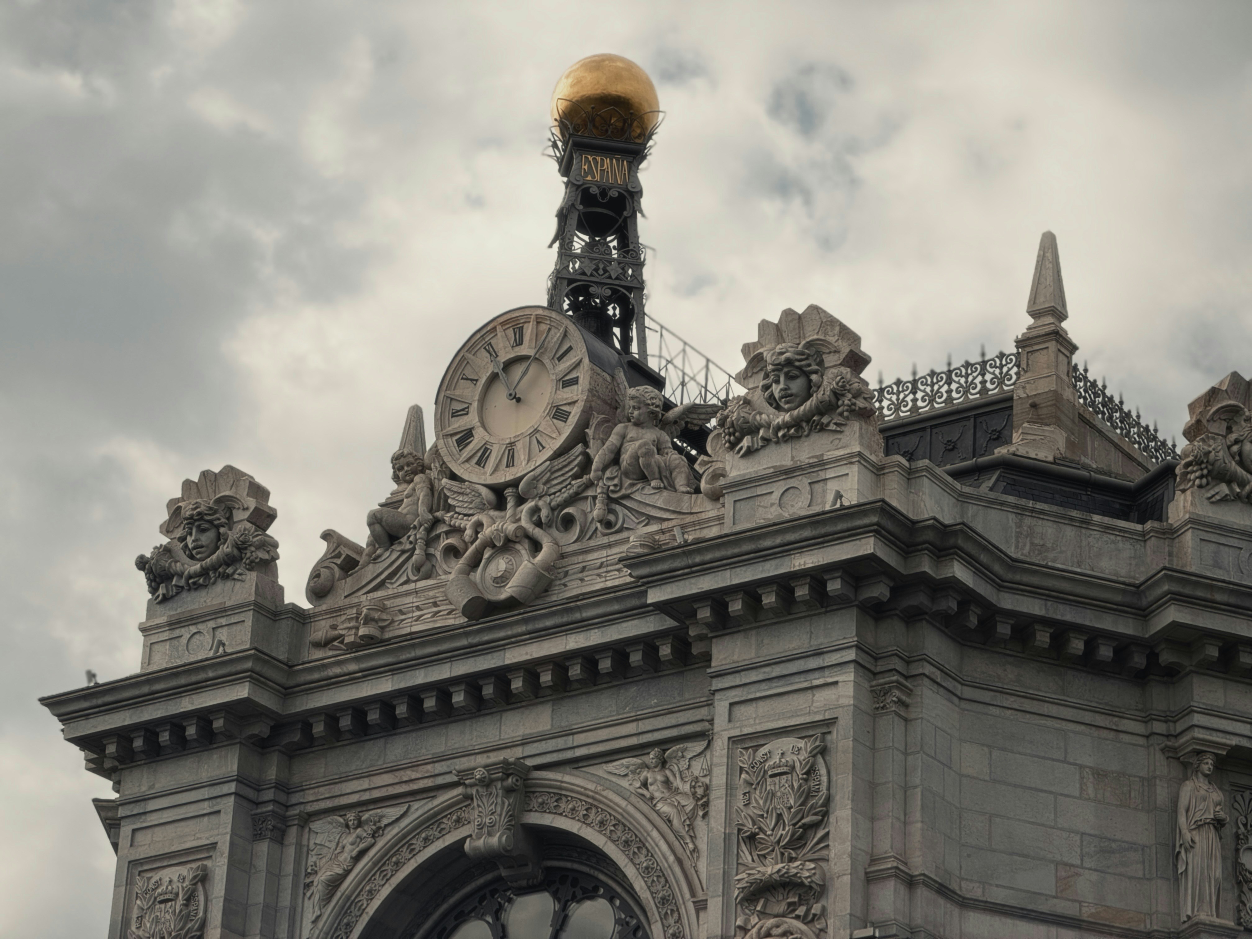 Ornate Clock Tower Crowned by Globe and Sunstone
