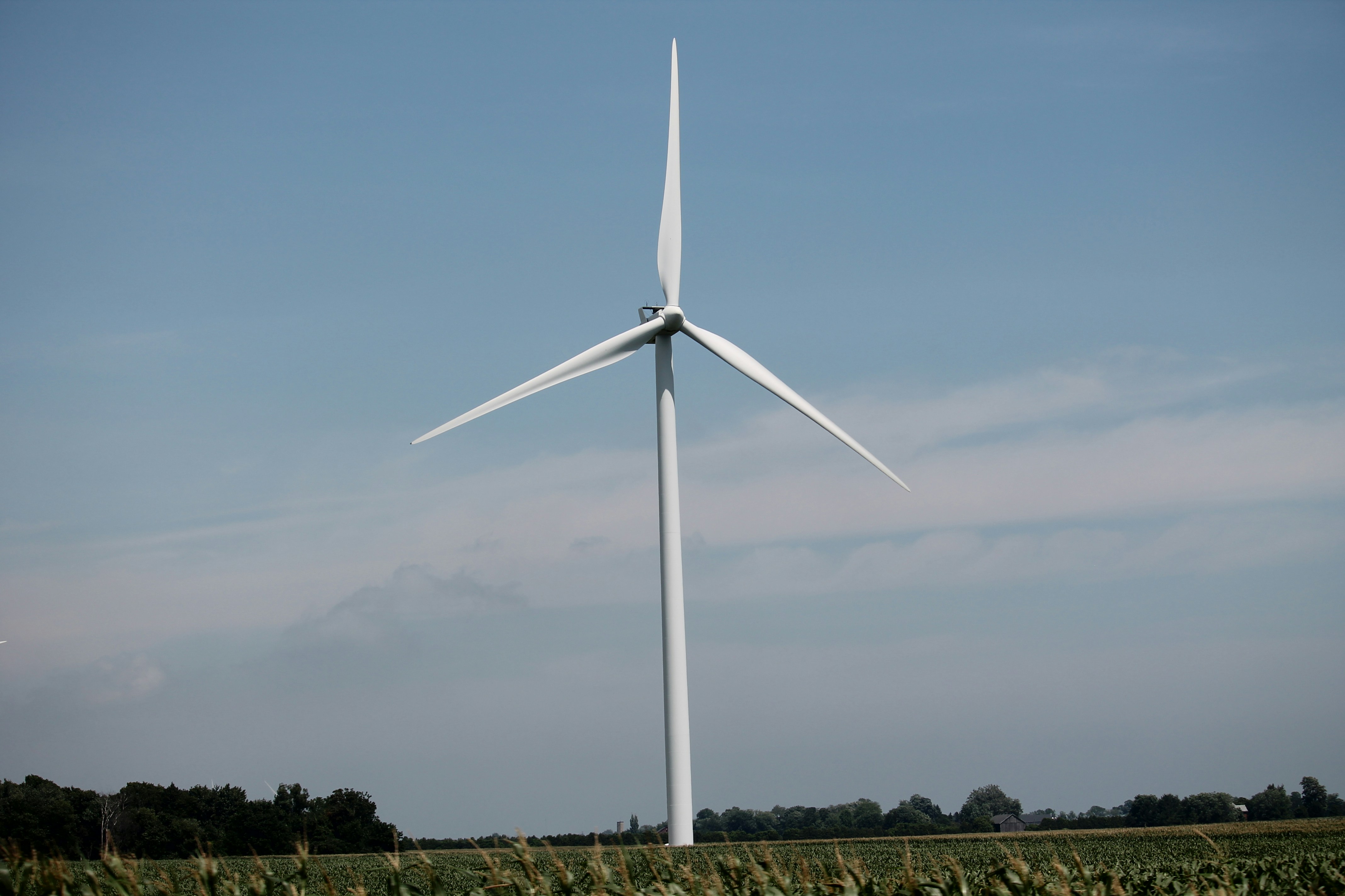 Monument of Quiet Power: A Lone Wind Turbine on the Horizon