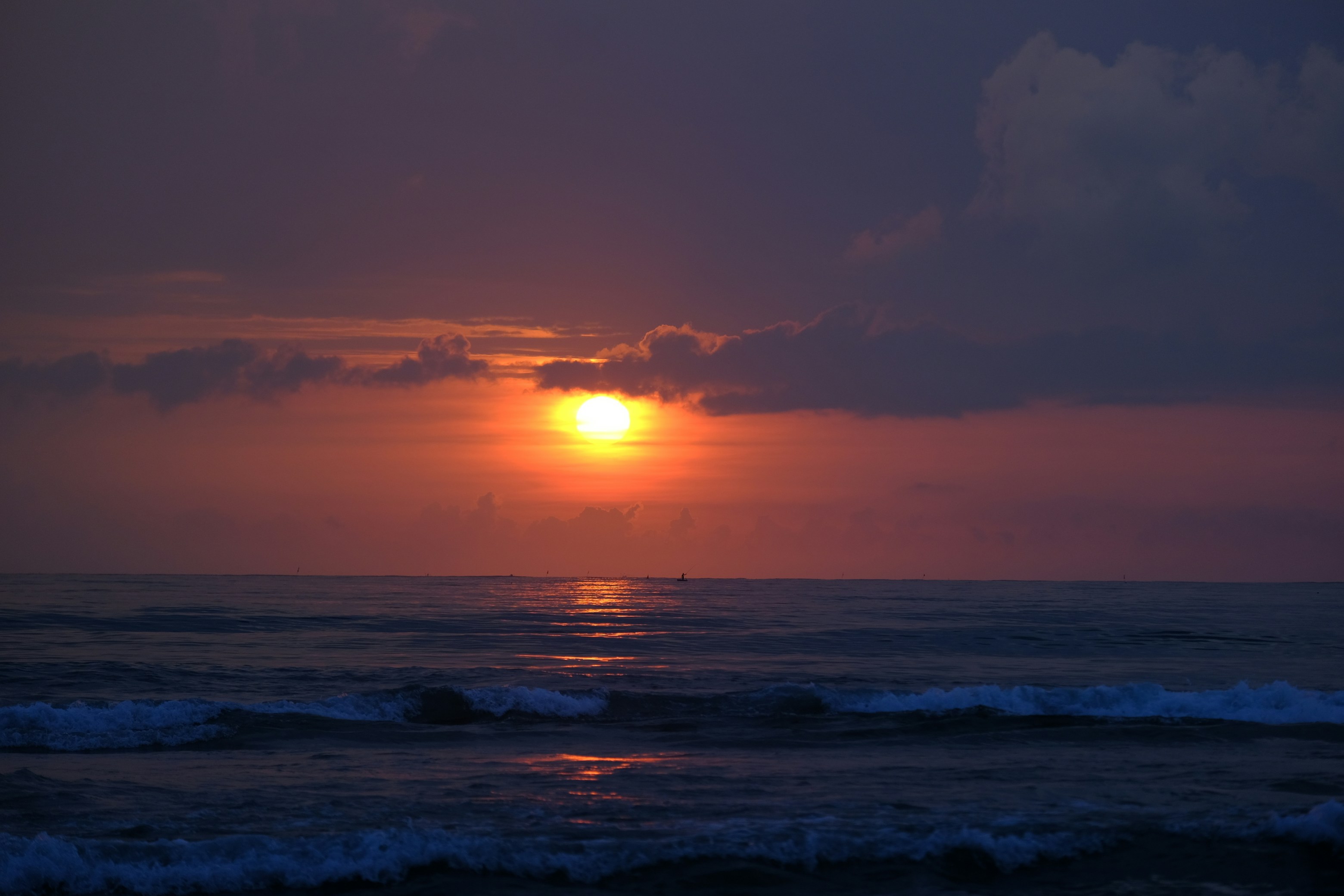 Horizon Ember: Sunset over a Quiet Sea