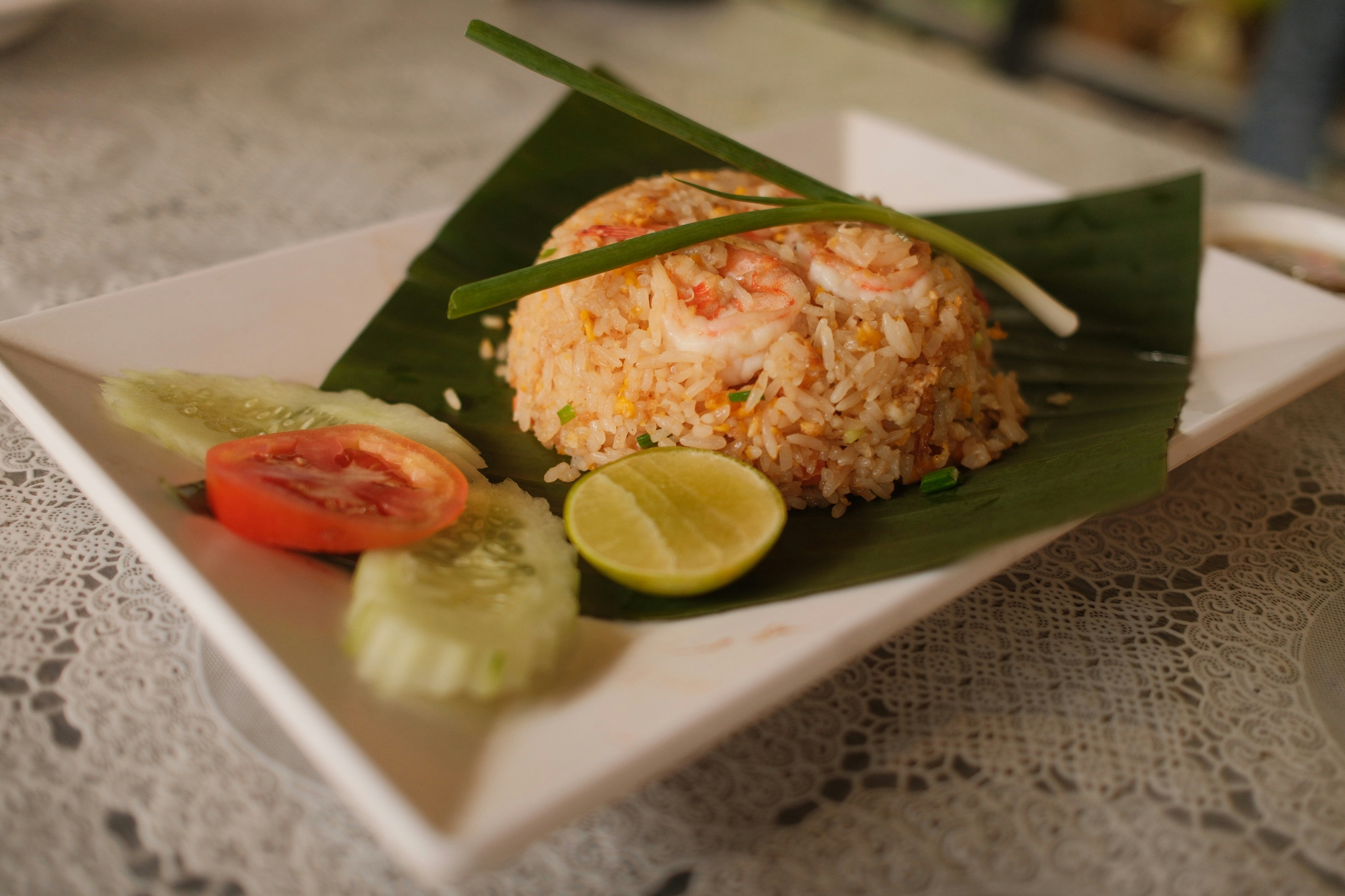 Citrus-Accent Fried Rice Nest on Banana Leaf