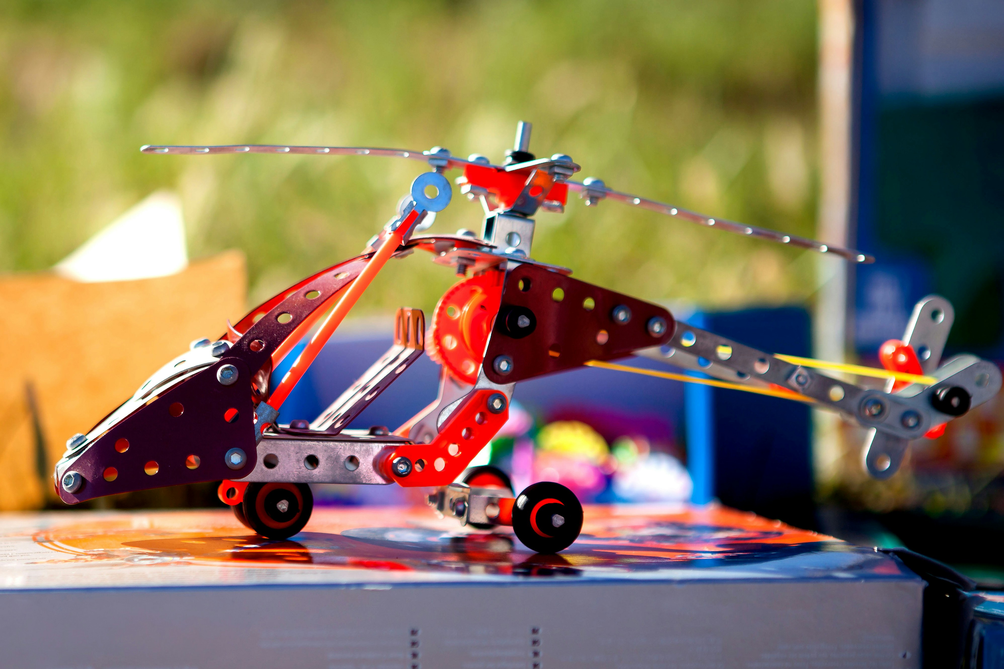 Metallic Toy Helix: A Mechanical Helicopter in Motion