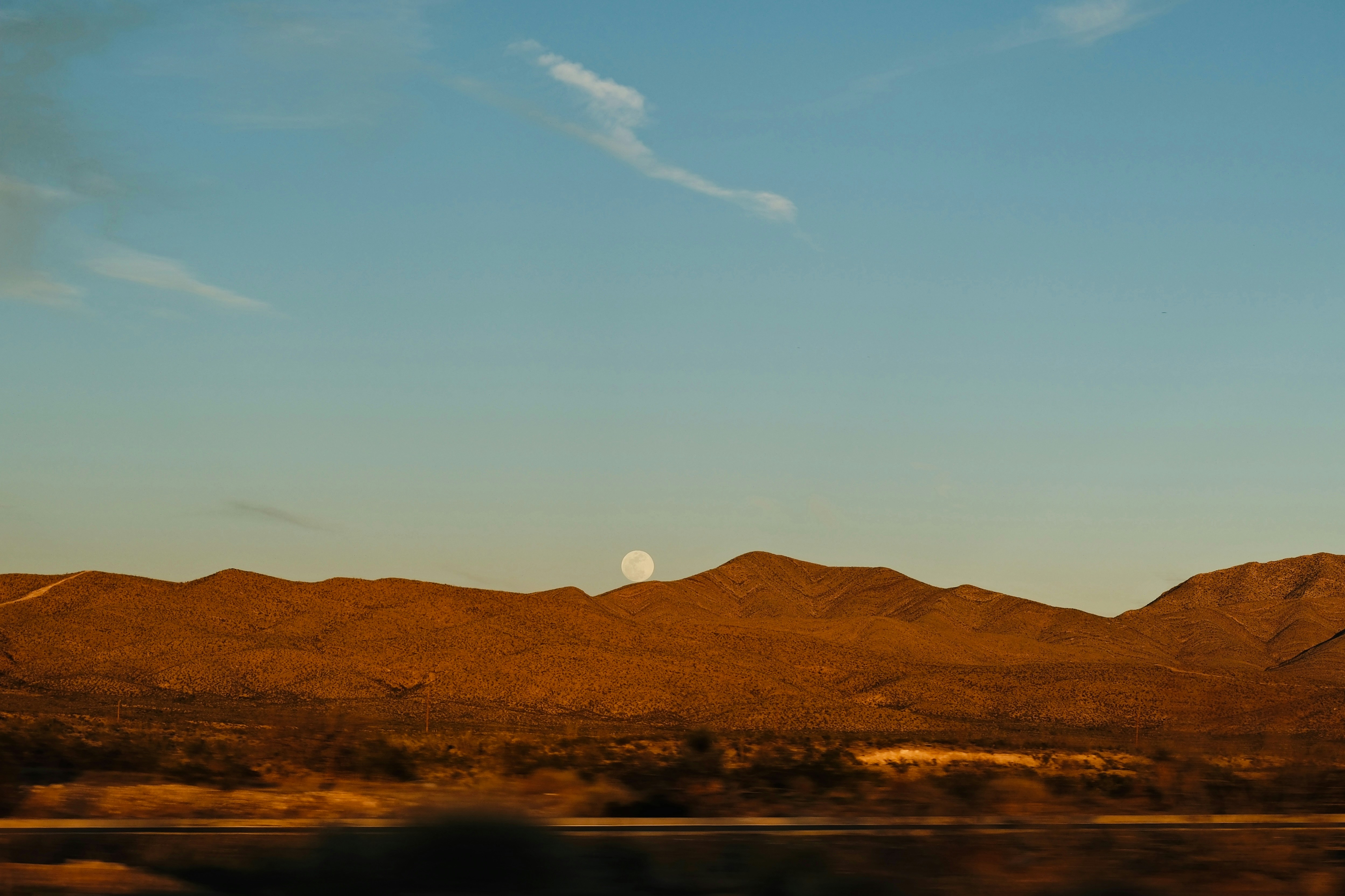 Moonrise Over the Arid Ridge