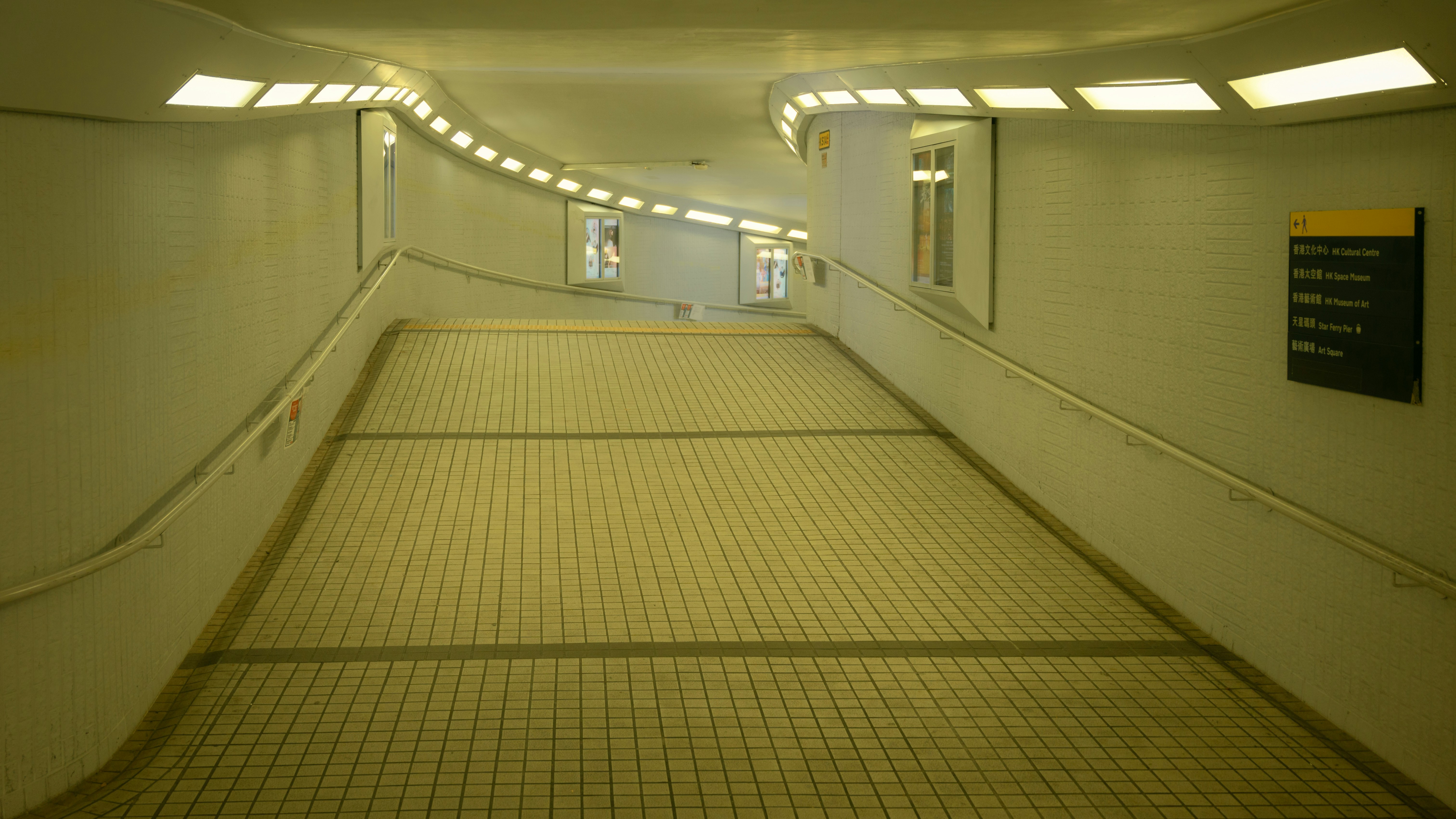 Mid-Tunnel Epiphany: Quiet Fluorescent Corridor