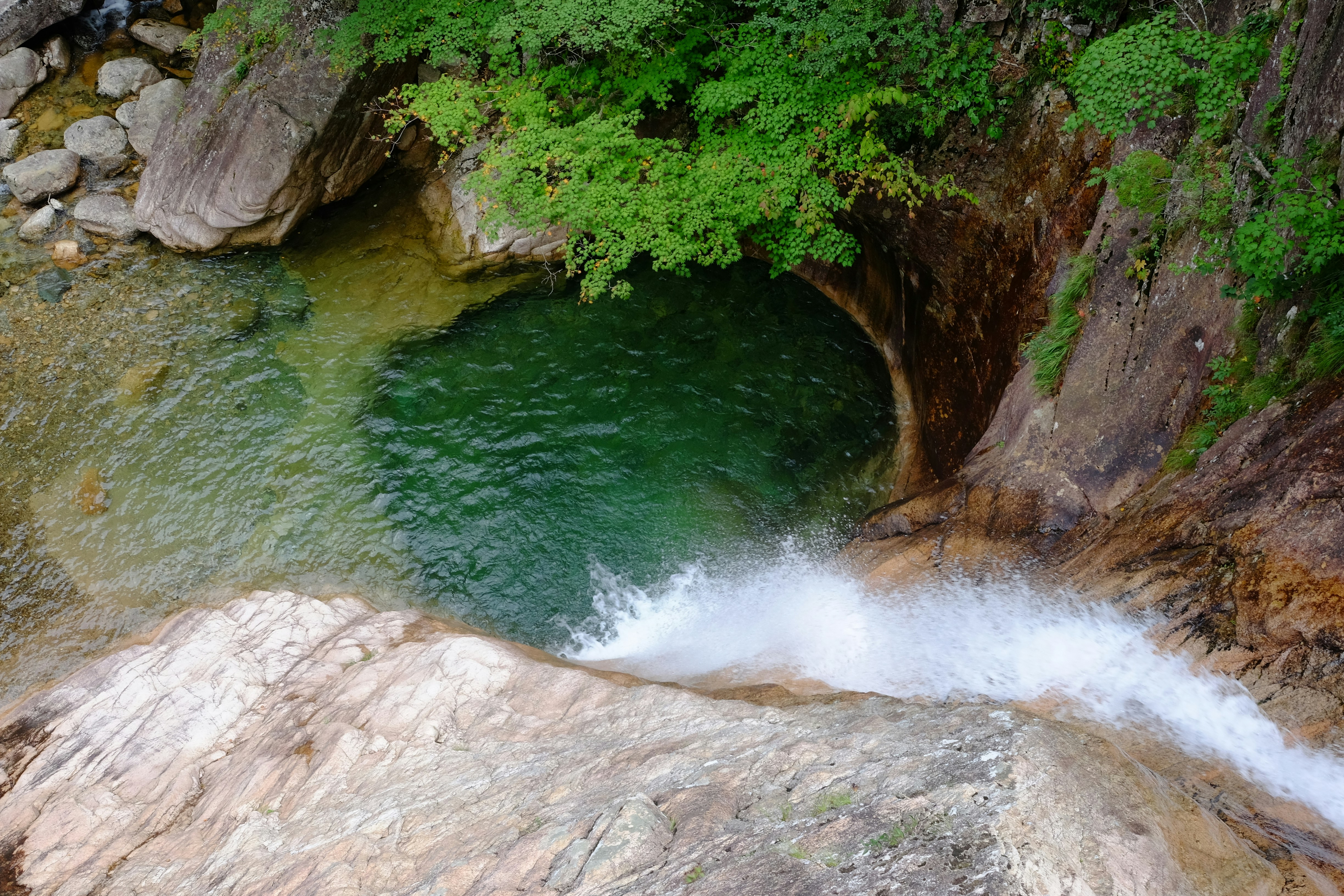 Emerald Pool and Aquatic Cliff: A Quiet Cascade Above Turquoise Water