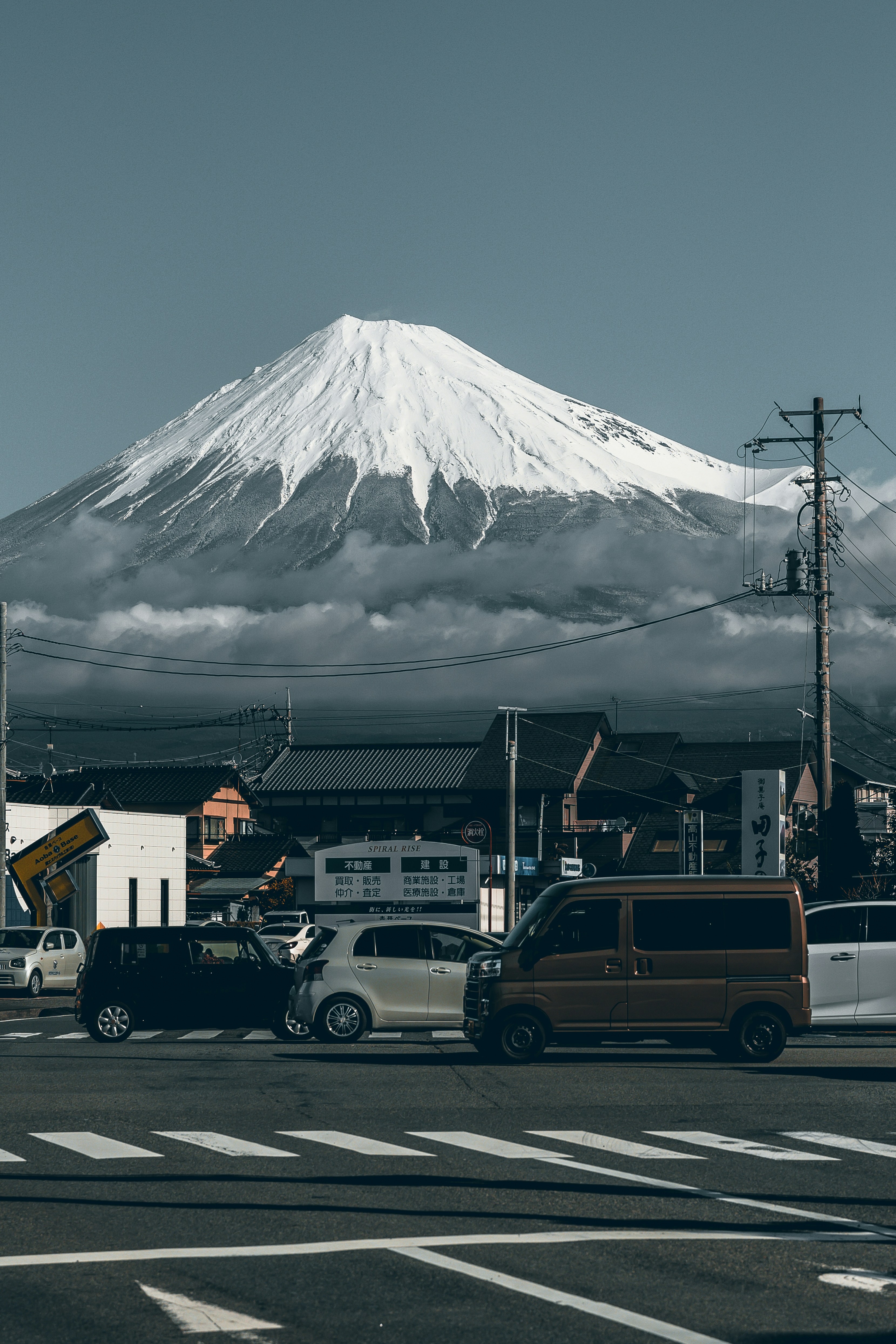 Snow-capped Peak Over a Quiet Street
