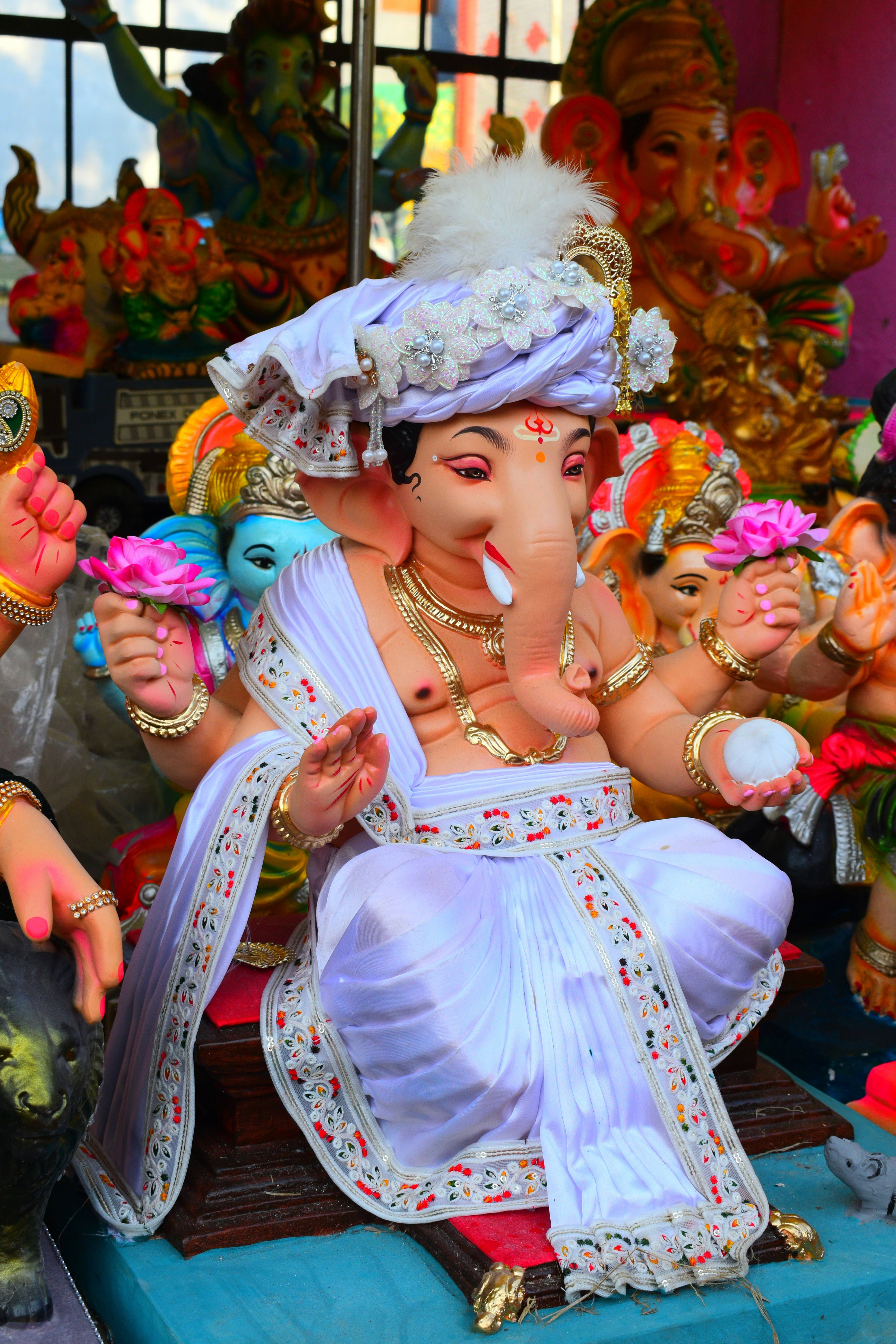 Primed with Joy: The White-Sari Ganesha in a Shrine of Color