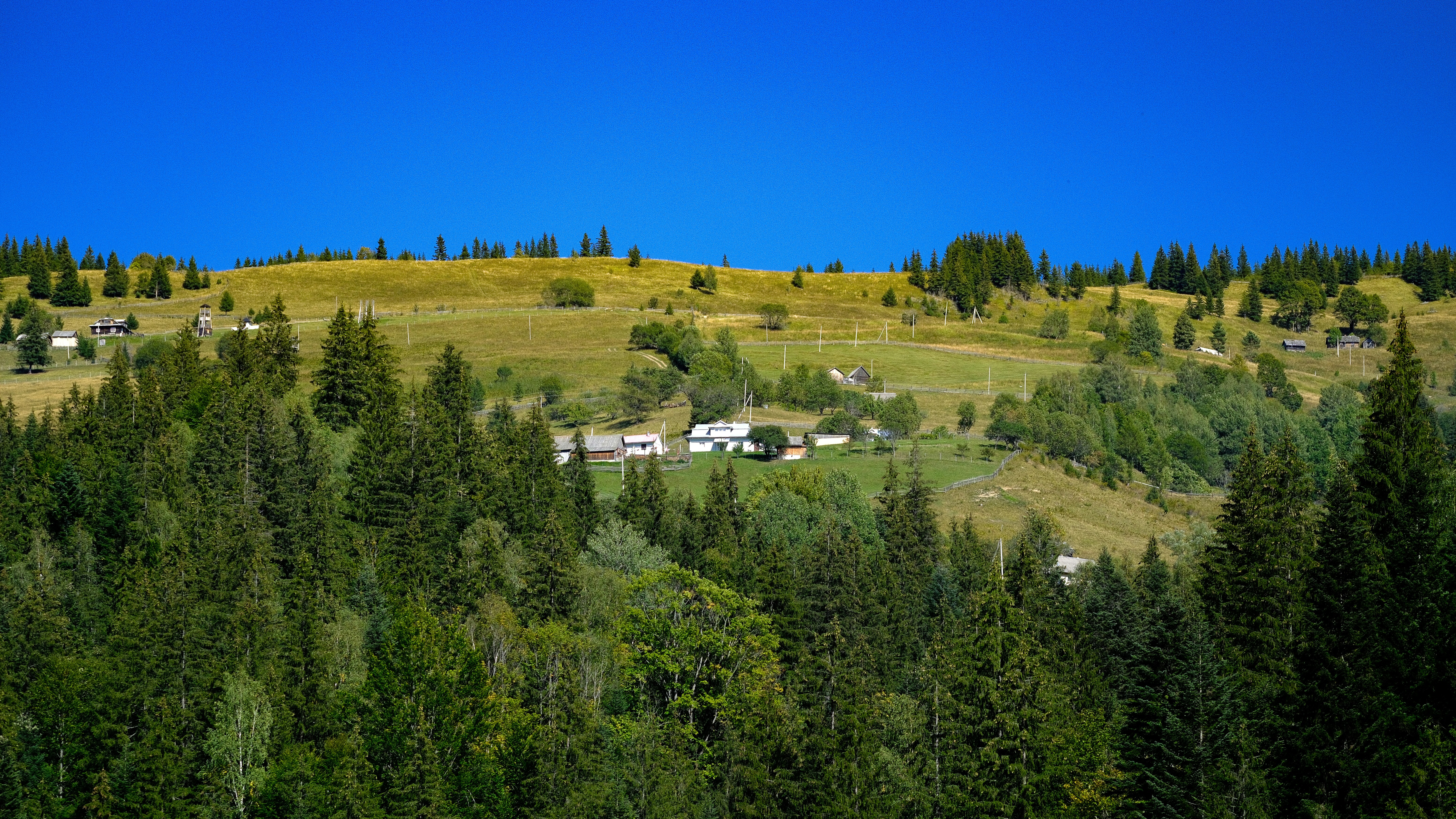 Hilltop Hamlet under a Clear Blue Sky