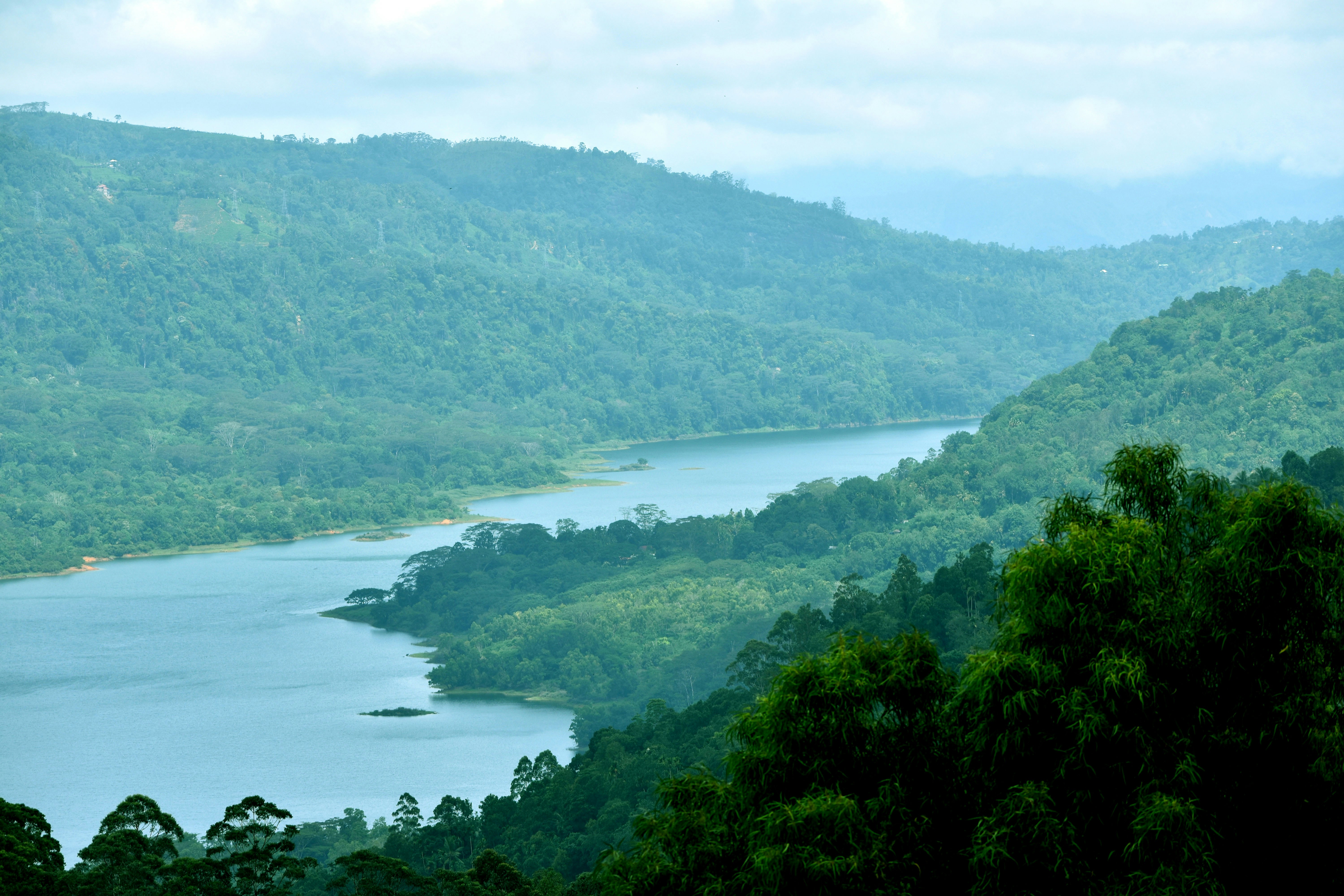 River Between Green Ridges: A Serene Valley Meander