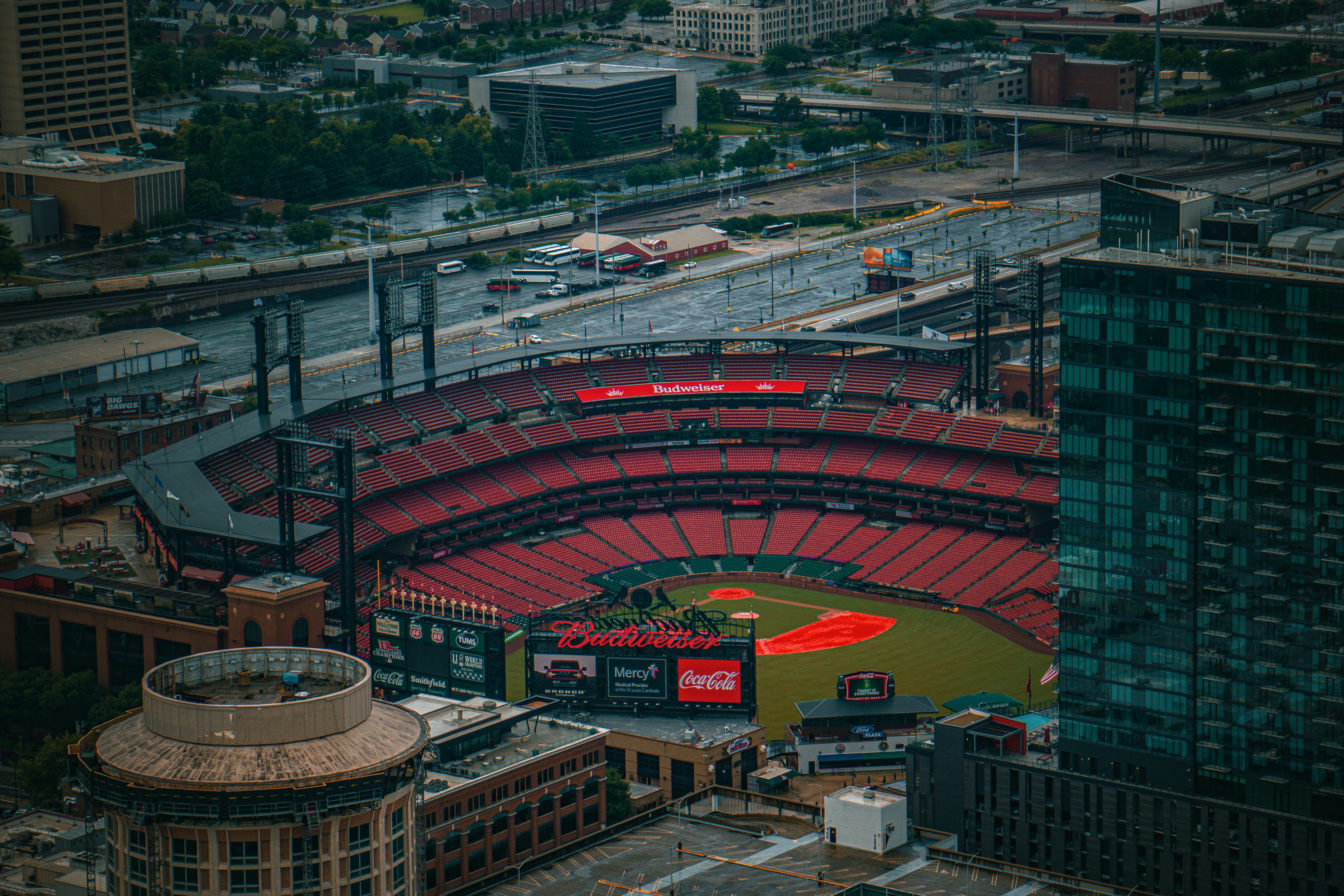 Aerial View Over The Red-Stadium Baseball Park Amid Downtown High-Rrises