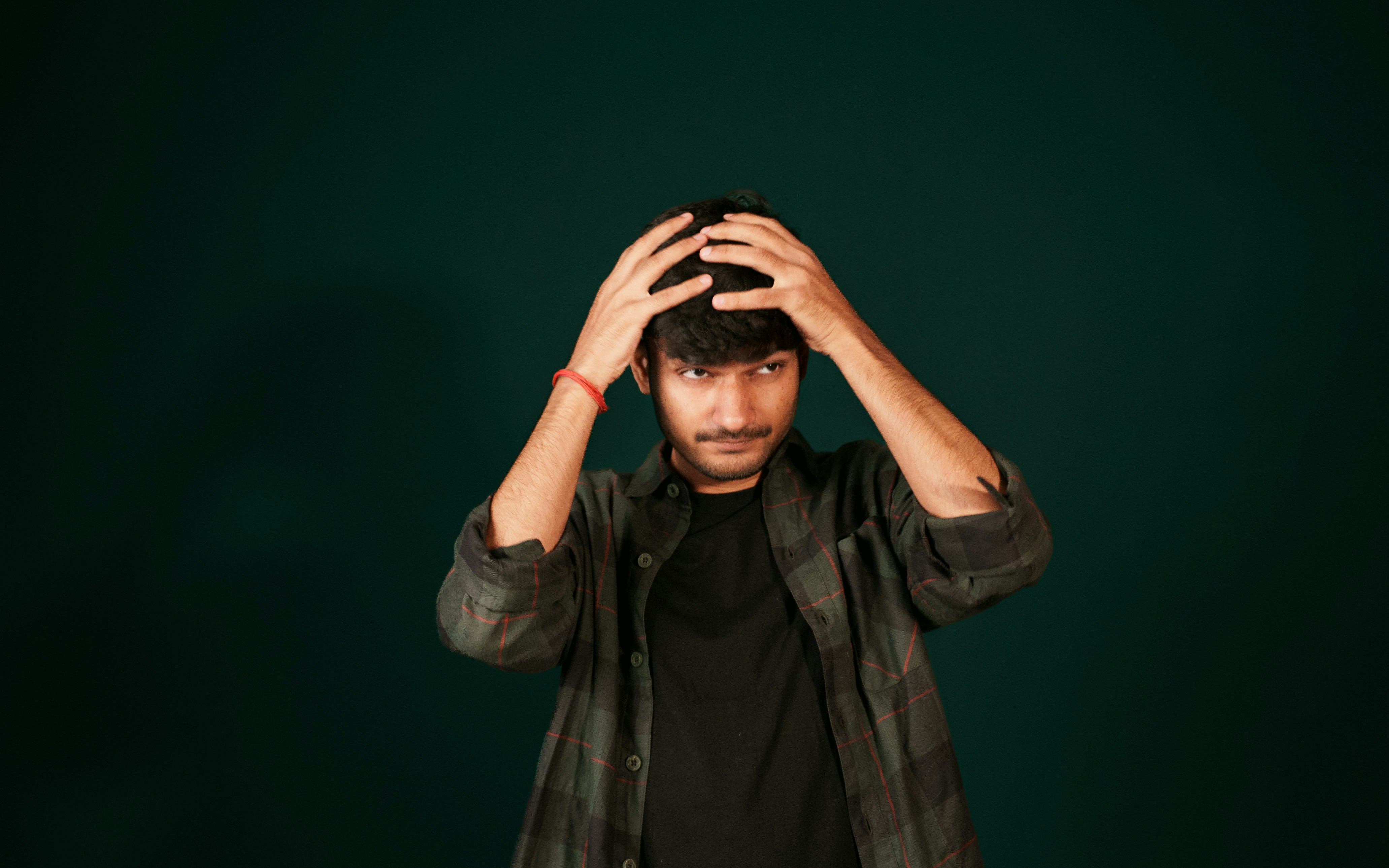 Headstrong in Green Studio: A Portrait of Focus