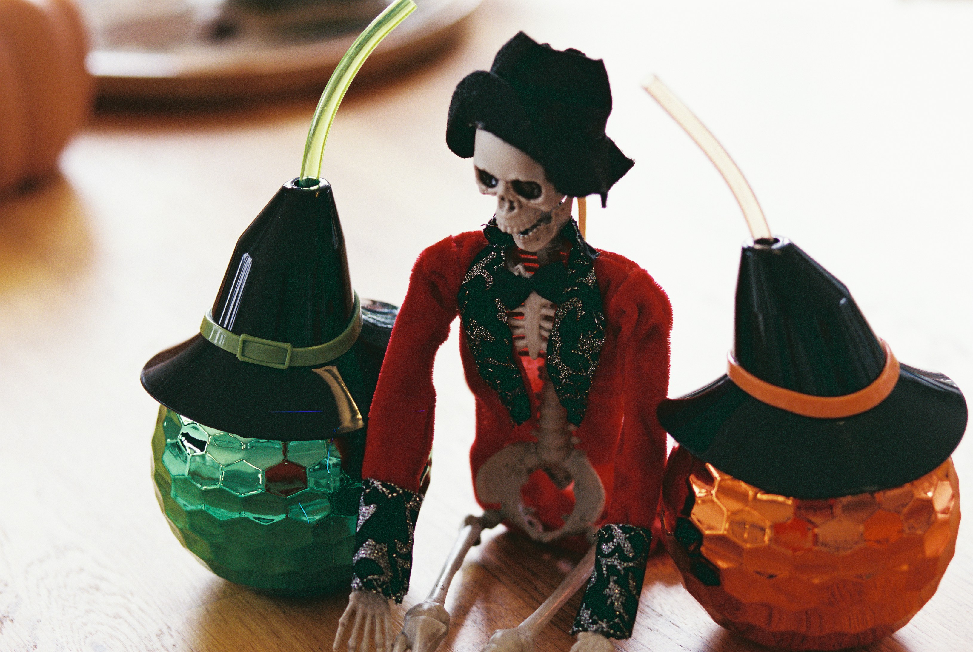 Skeleton in Red: A Tiny Stage Scene Between Lanterns