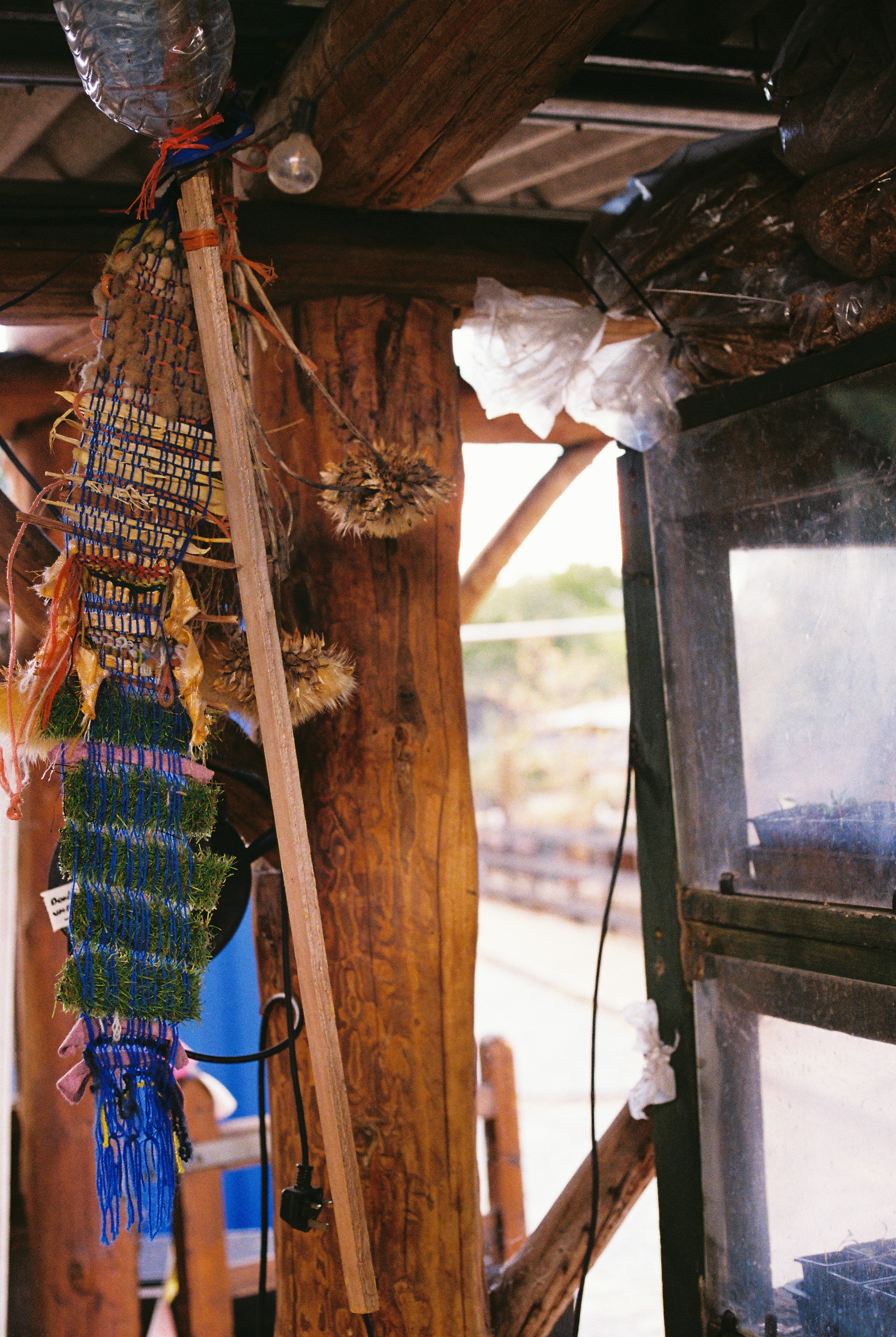 Sunlit Shed: Textures and Threads in a Rustic Interior