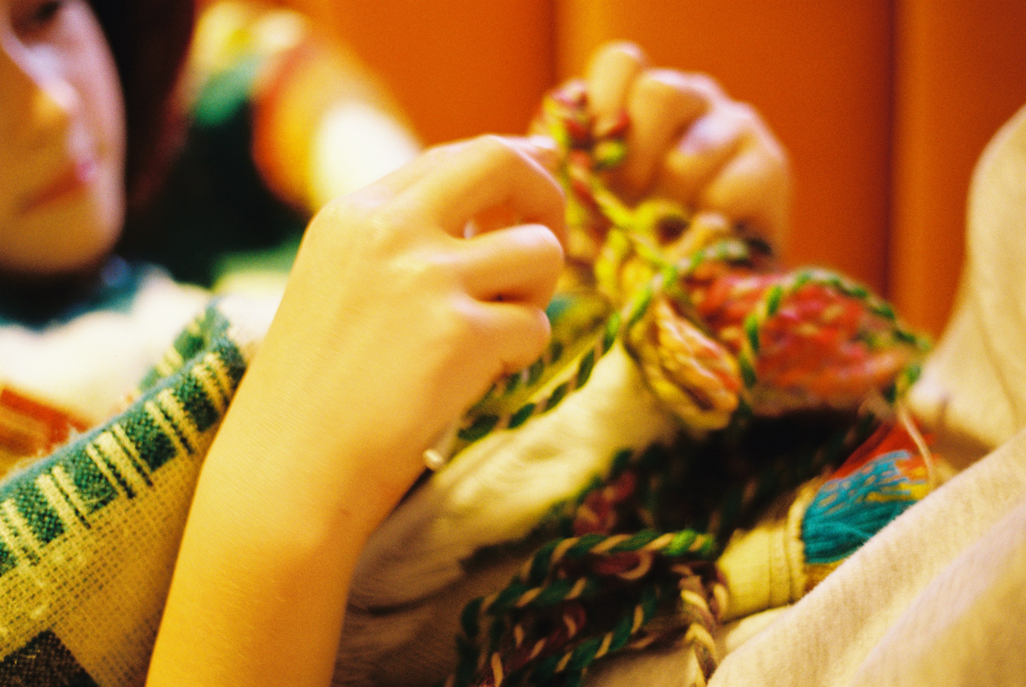 Hands at Work: Weaving Threads of Color