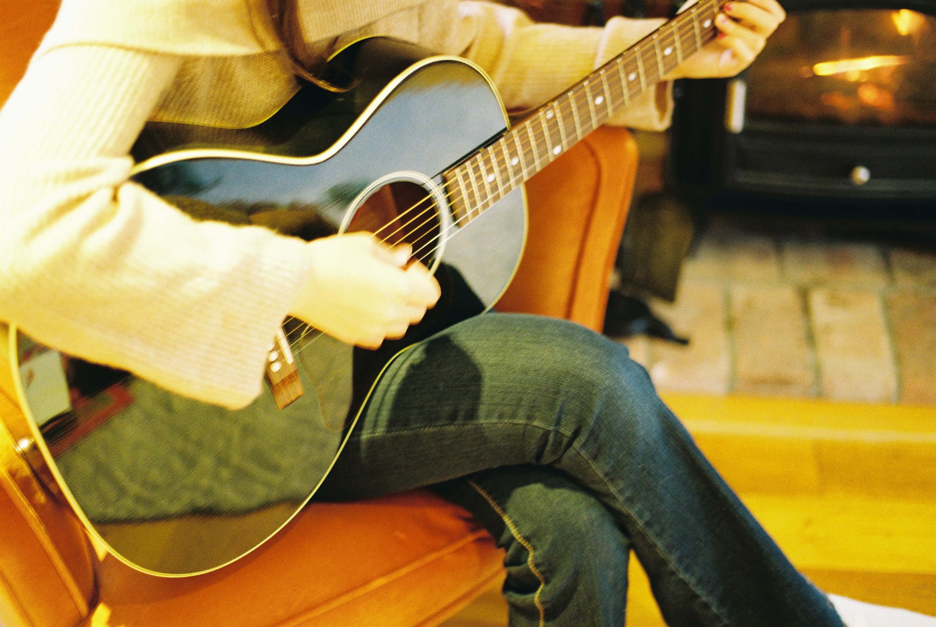 Guitarside Serenade: Quiet Hands on a Cozy Evening
