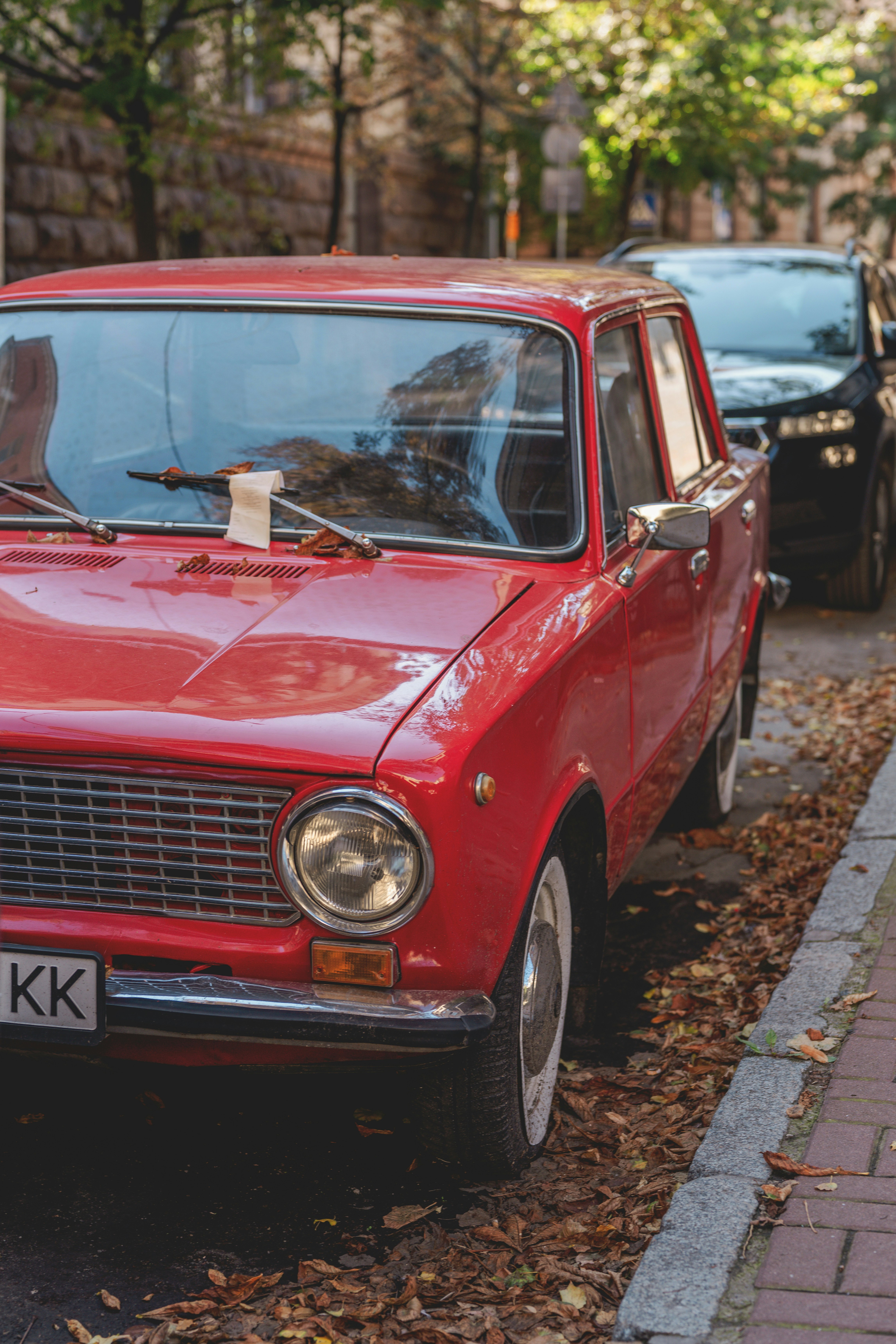Red Classic: A Street-parked Icon Still Shining