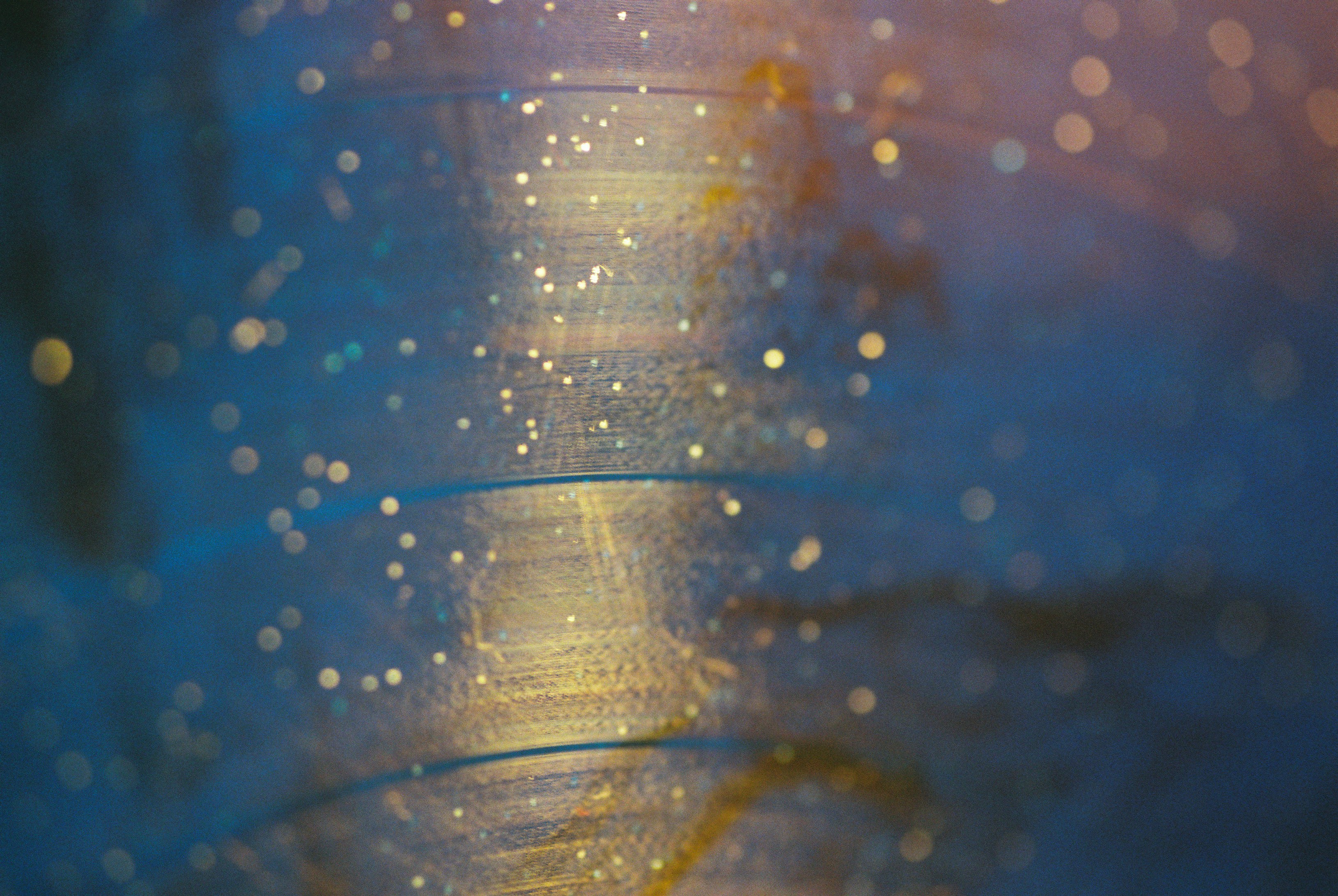 Glowing Orbs on a Velvet Blue Surface