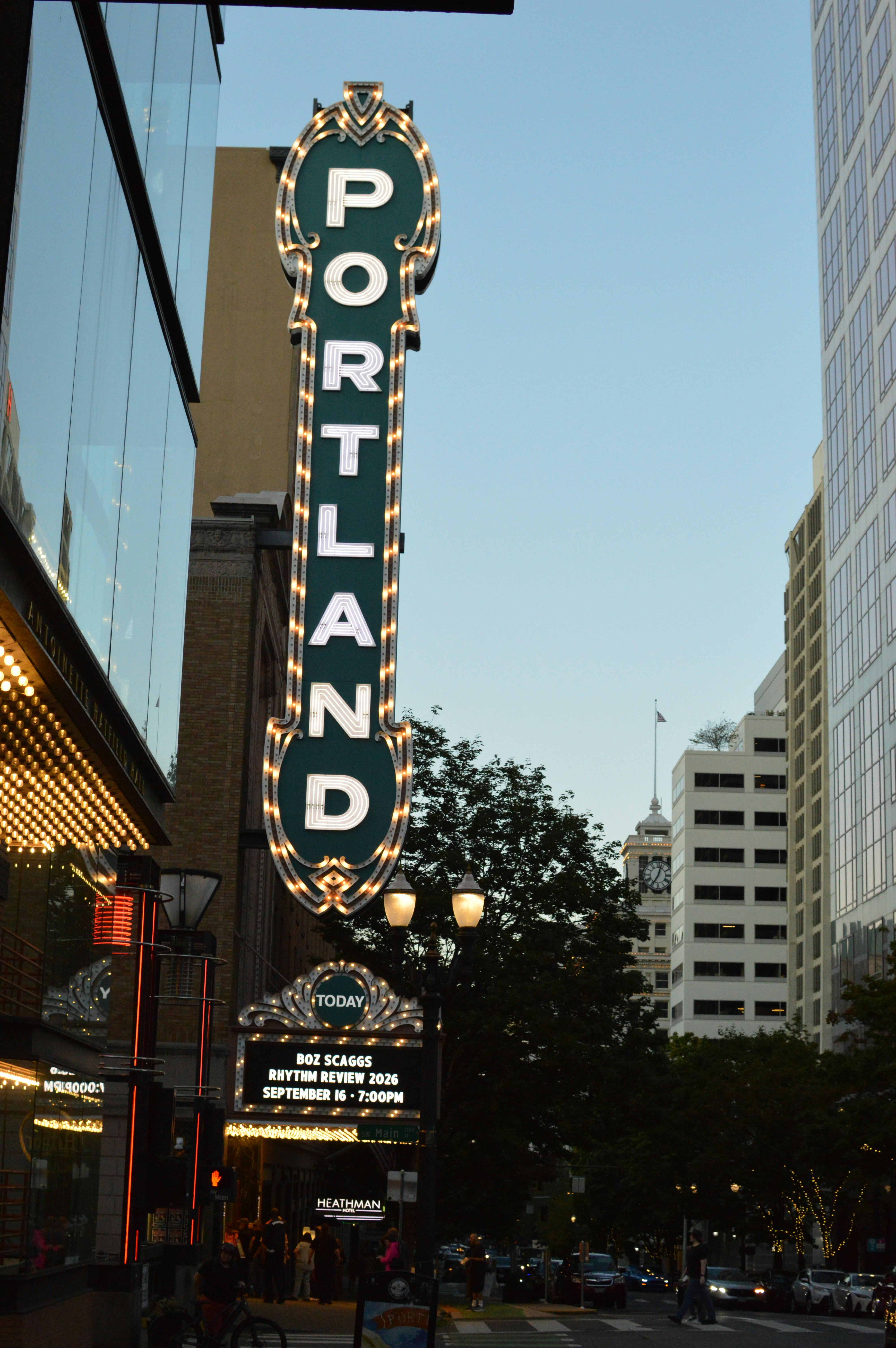 Neon Portico: The Portland Sign Stands Bold above a Quiet City Street