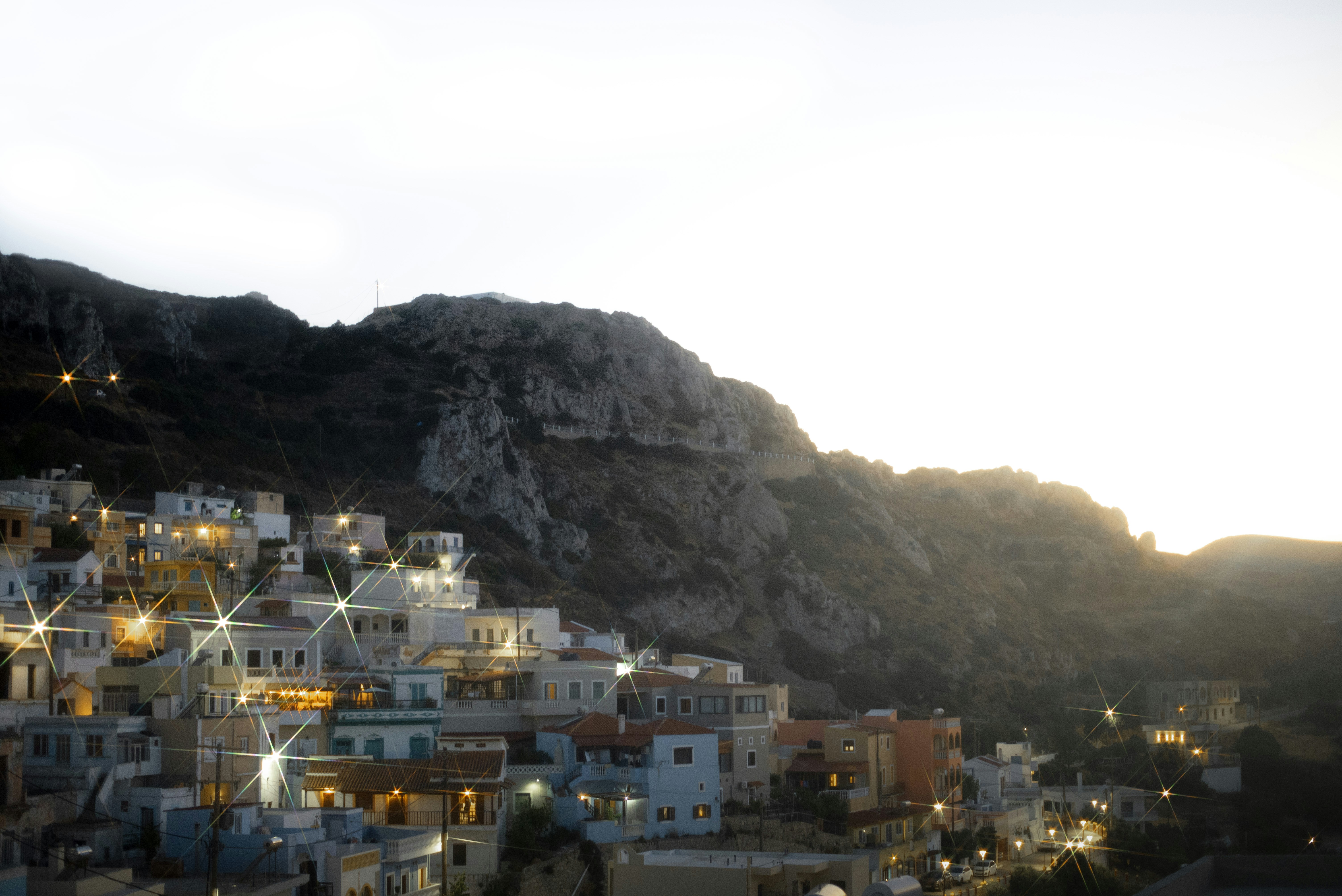 Dusk Lights Crown a Coastal hillside village