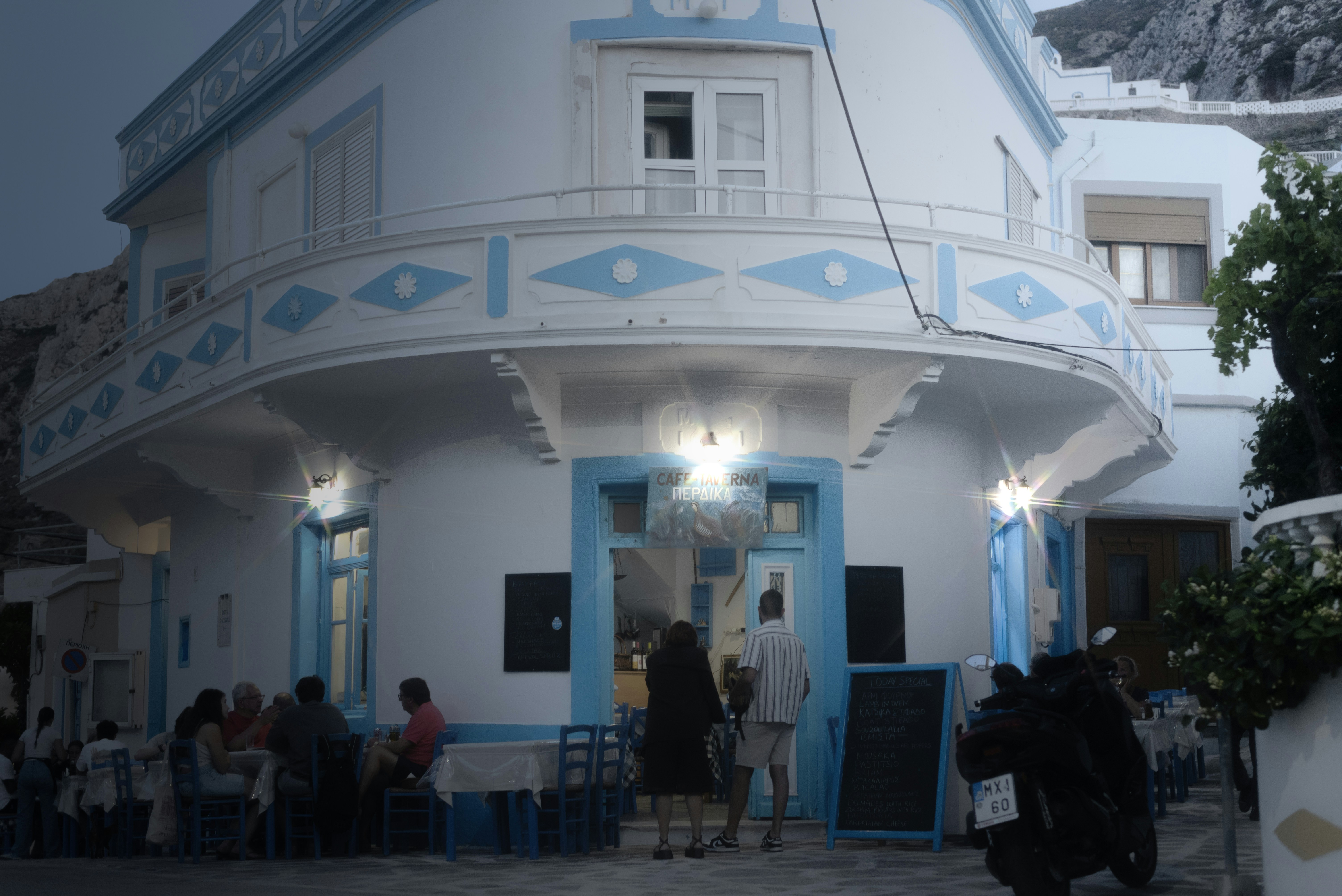 Blue Terrace Café at Dusk: A Tangible Calm in Santorini-like Architecture