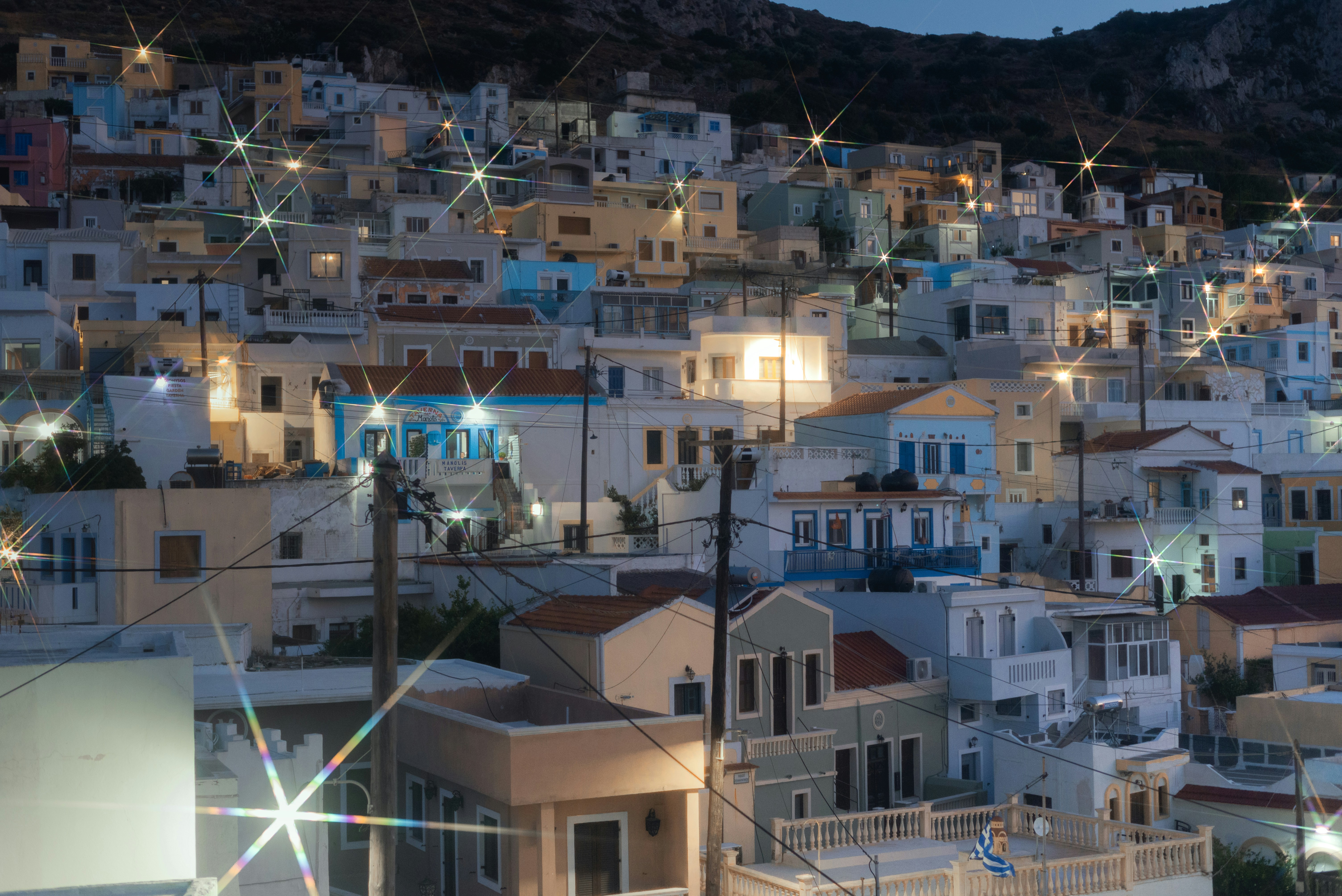 Night Lights Over a Colorful Hillside Village