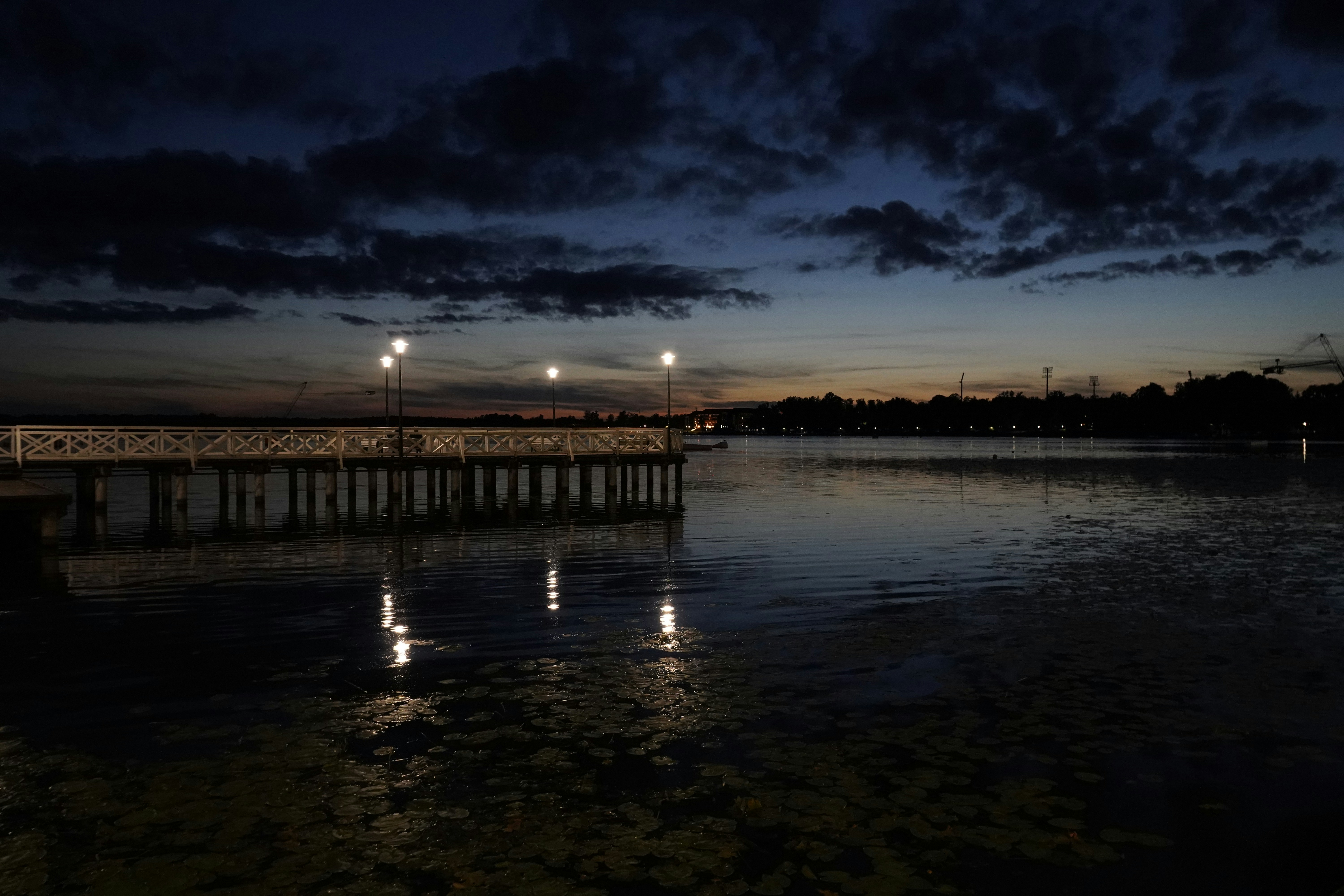 Dusk Pier: Lights, Water, and Quiet Reflections
