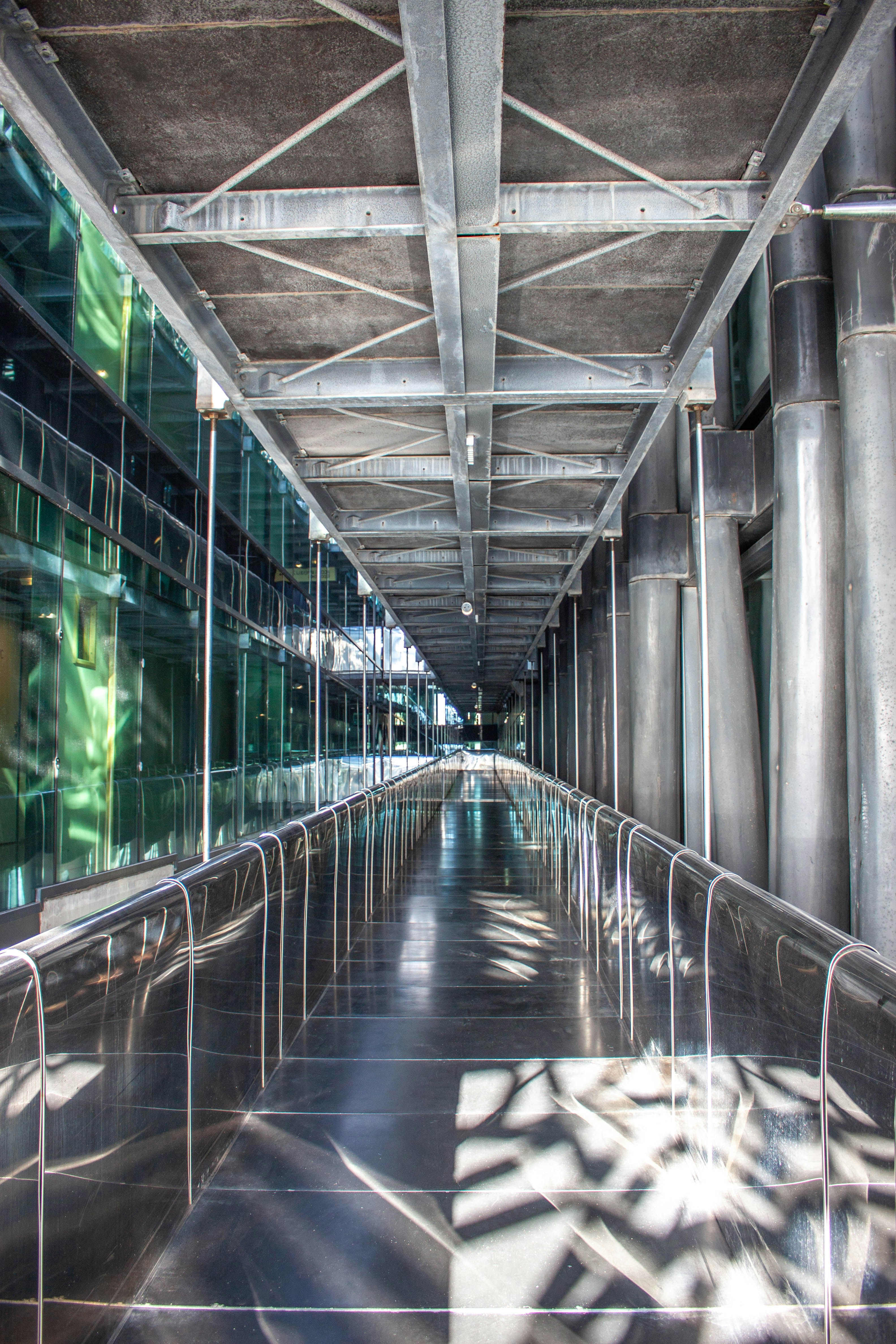Converging Corridor: Steel Beams and Glass Bathed in Light