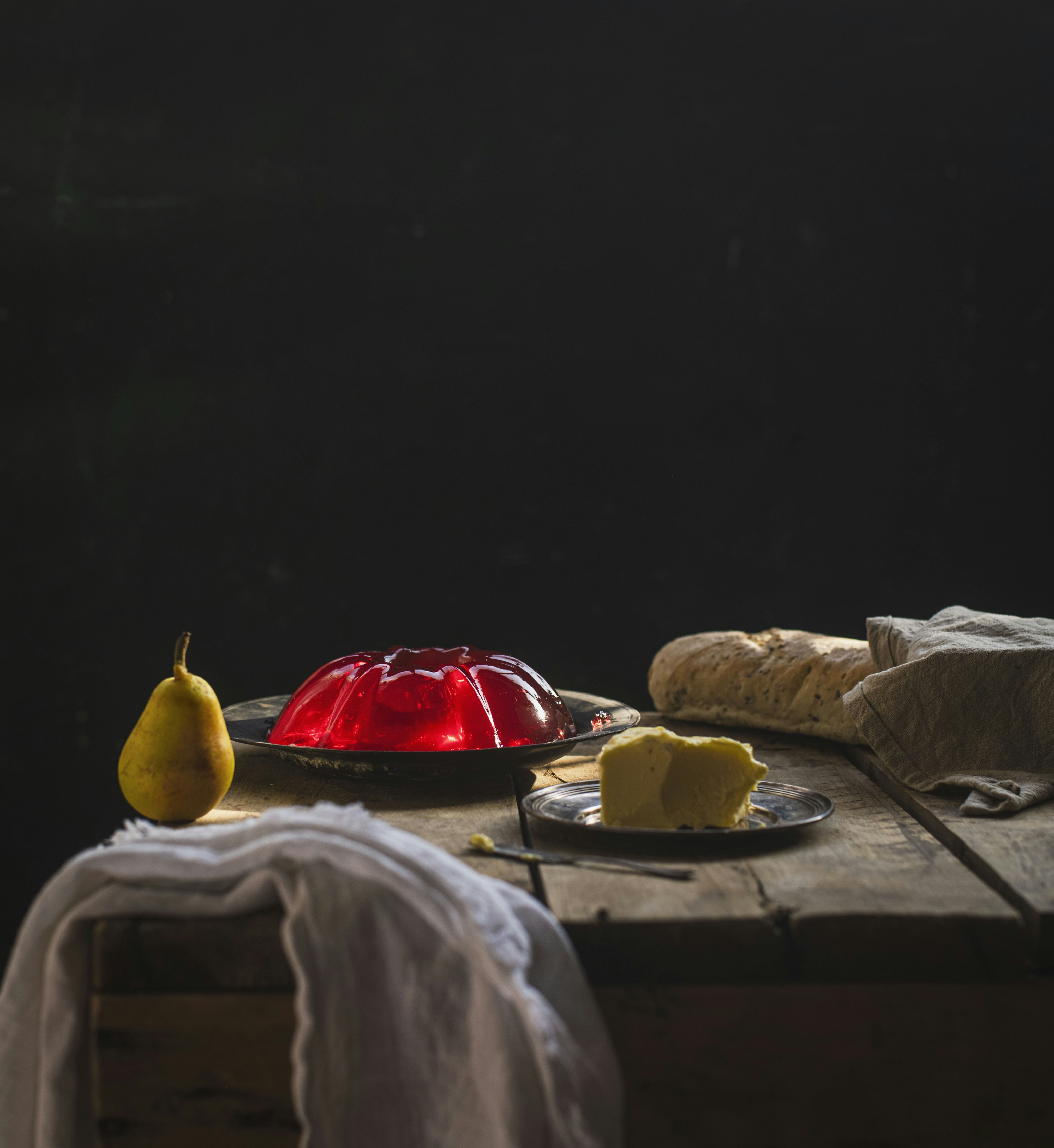 Red Jelly Dome on a Rustic Table