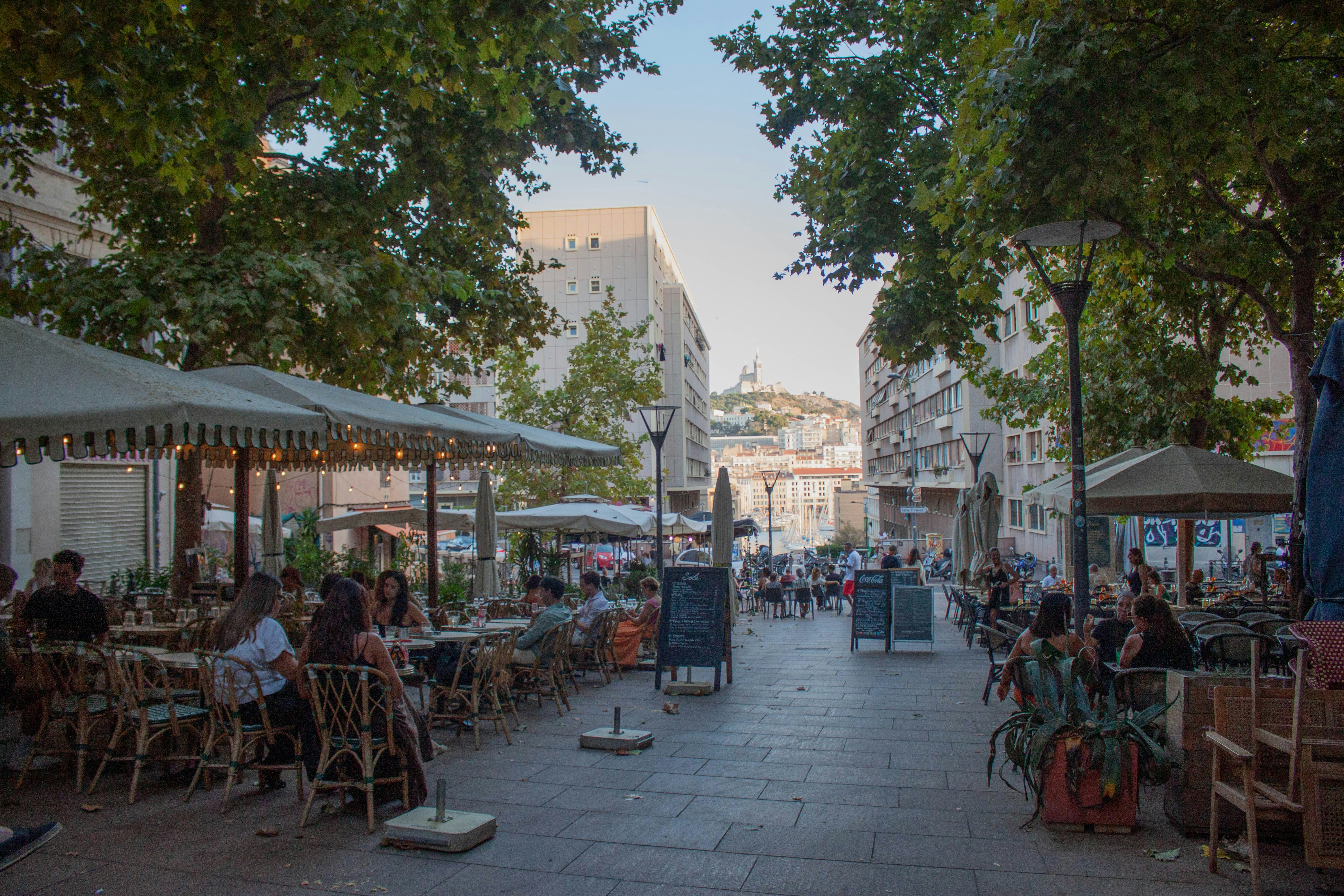 Cobbled Street Café in Soft Evening Light