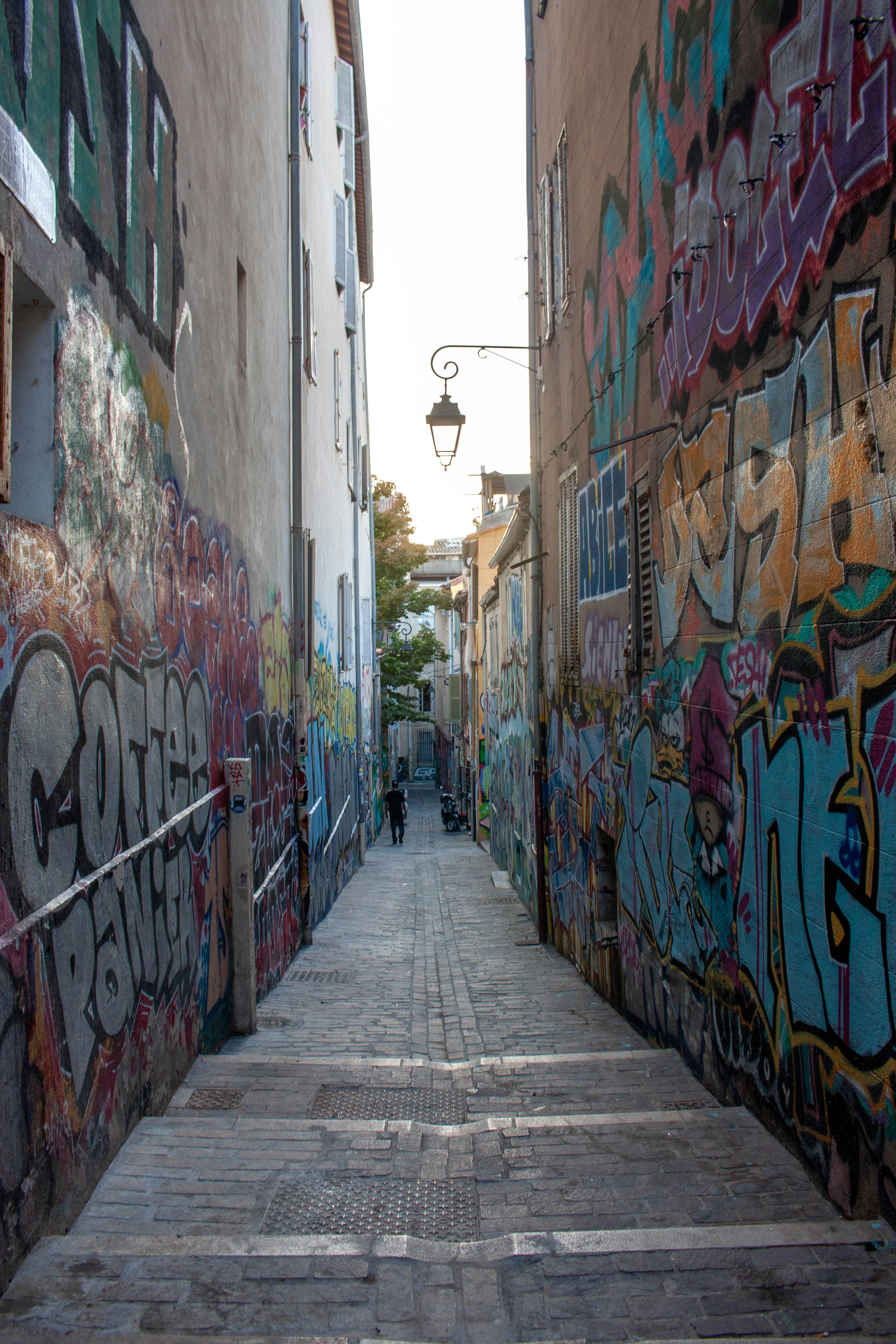 Graffiti Alleyway: Echoes of Color and Cobblestones