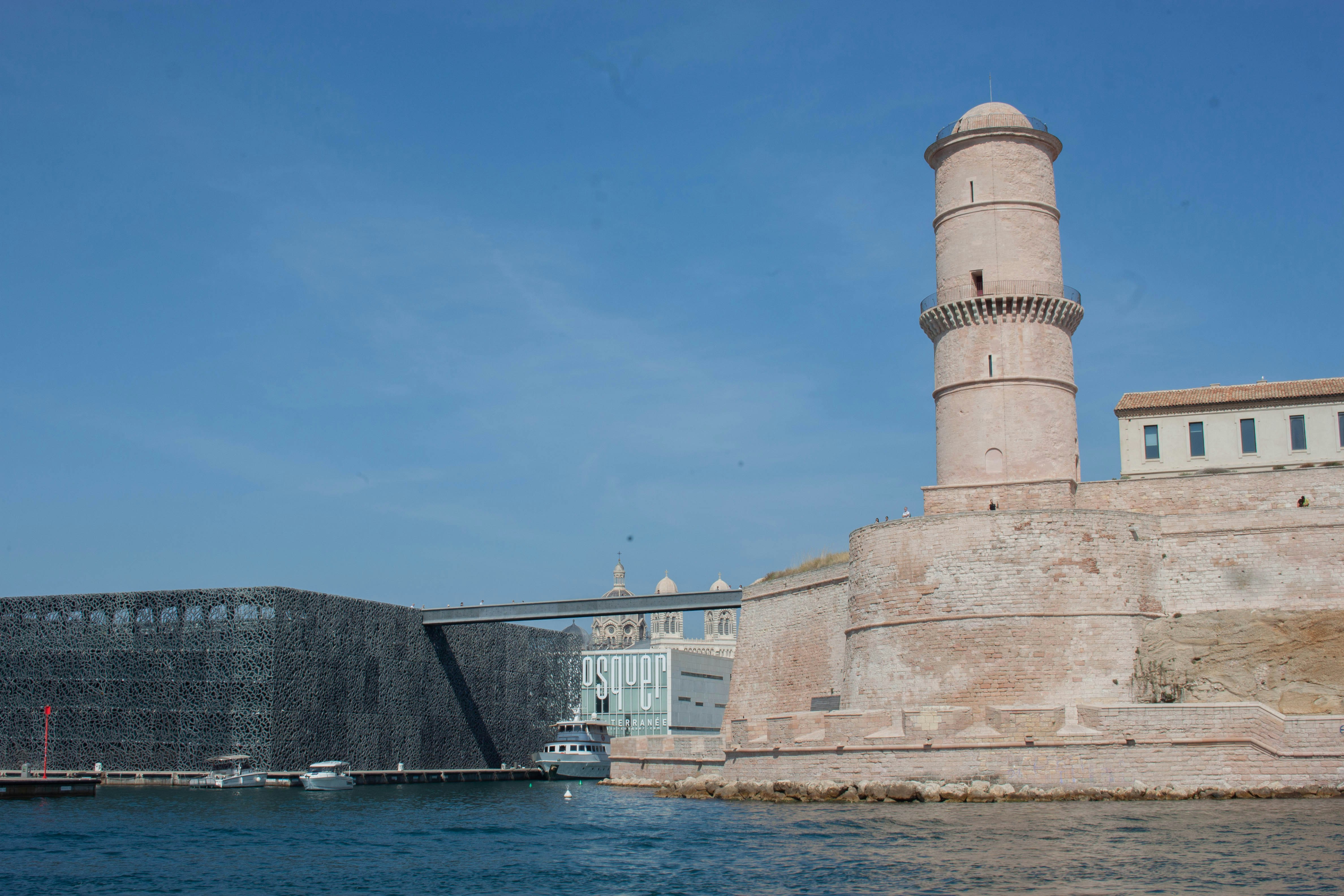 Harbor Sentinel: The Old Fortress and Modern Quay