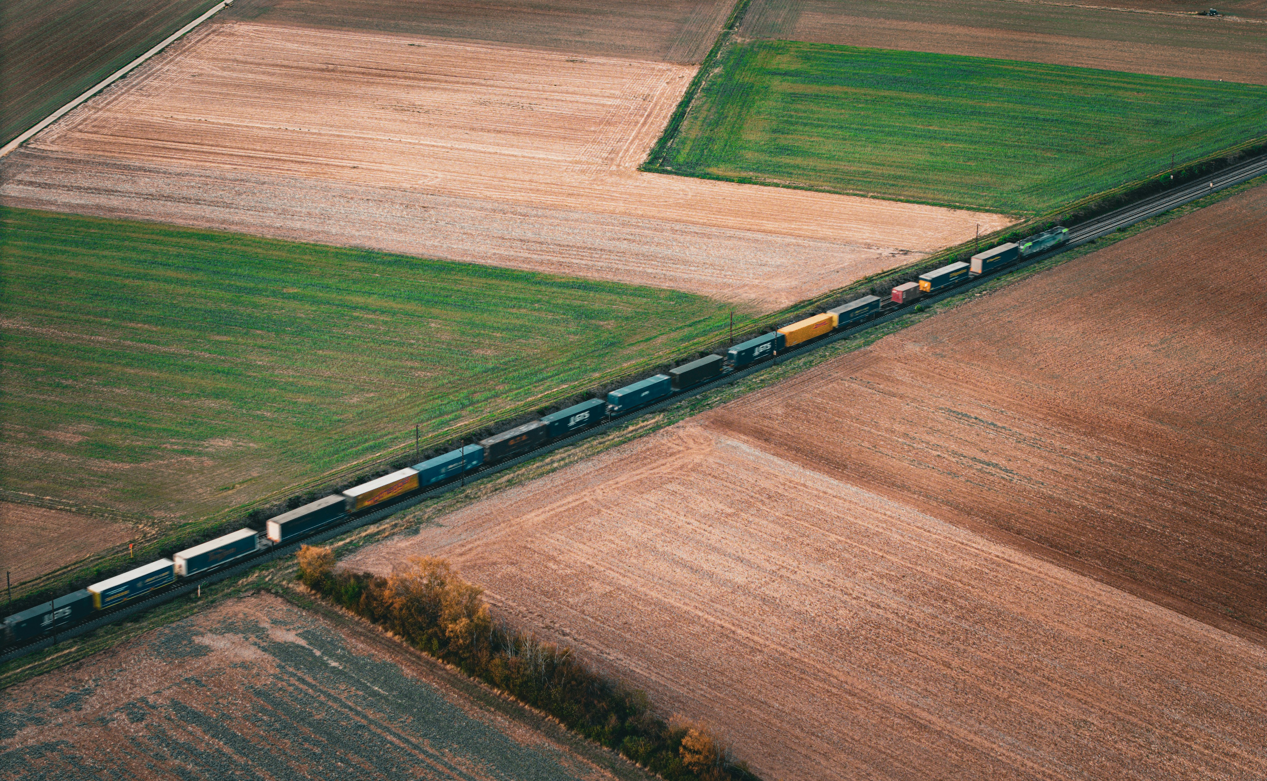 Aerial Rail-line Through Patchwork Fields