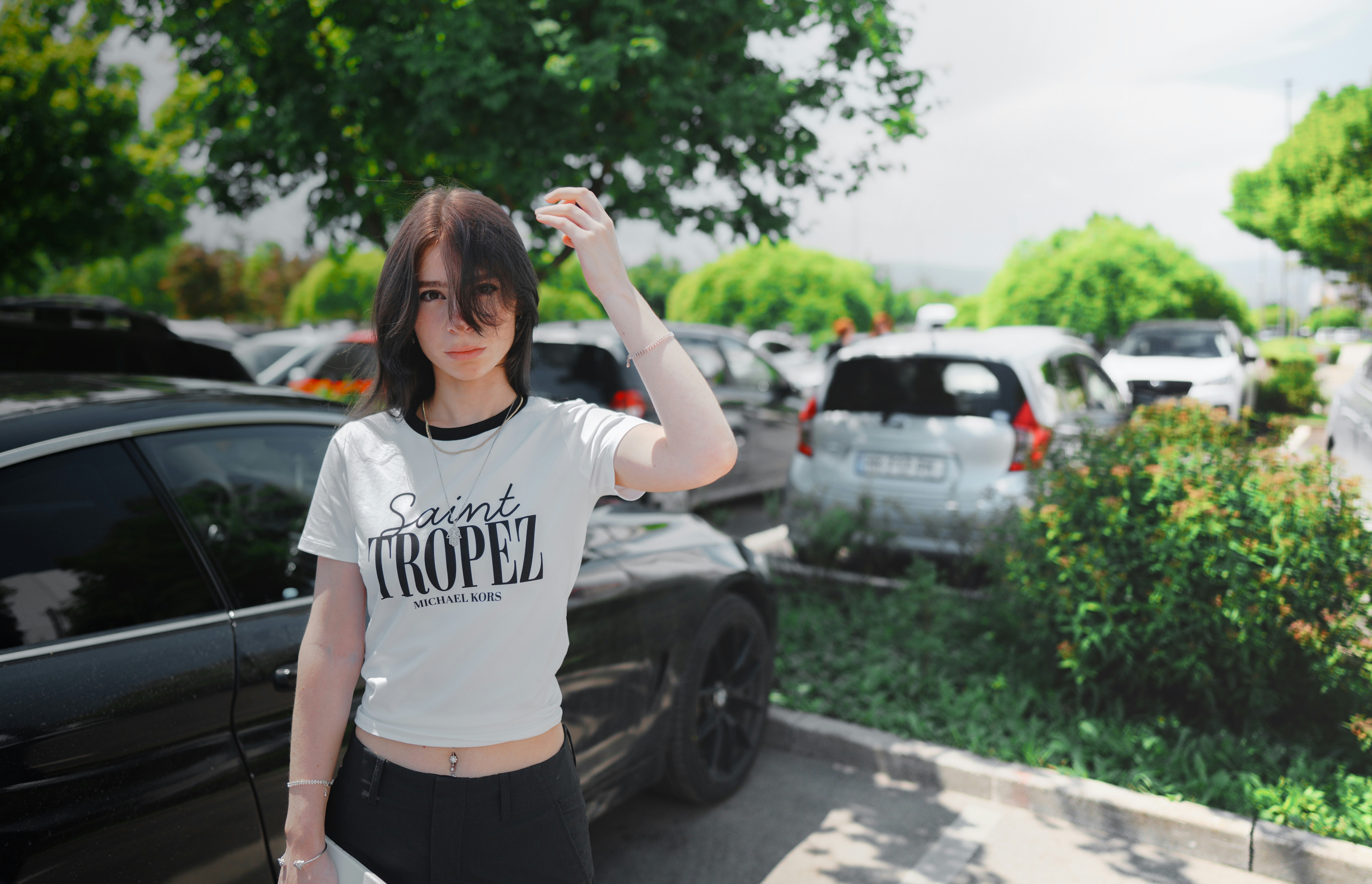 Sunlit Street Portrait: Casual Confidence in a Park-Quiet Lot