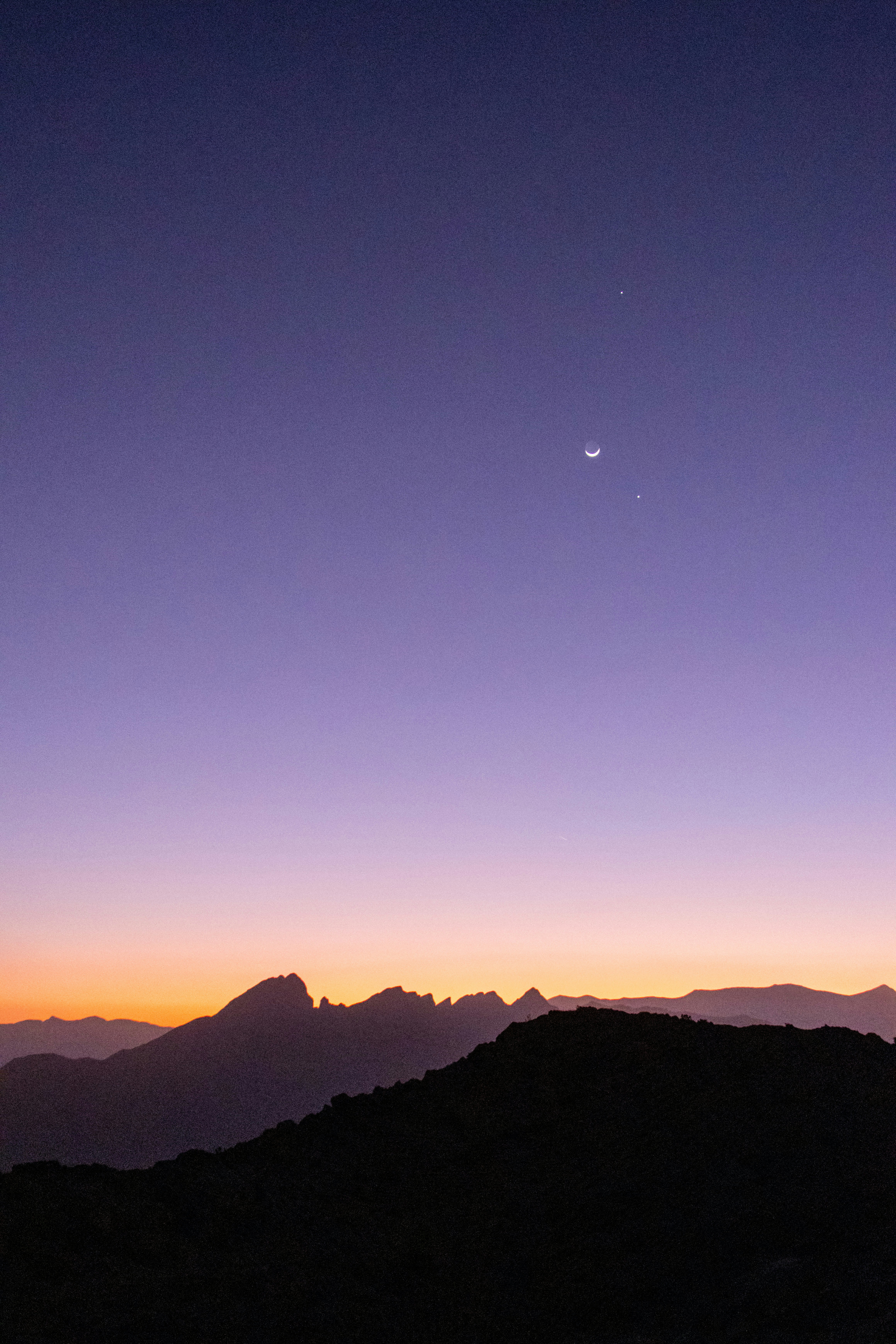 Dusk Crescent Over Silent Ridges