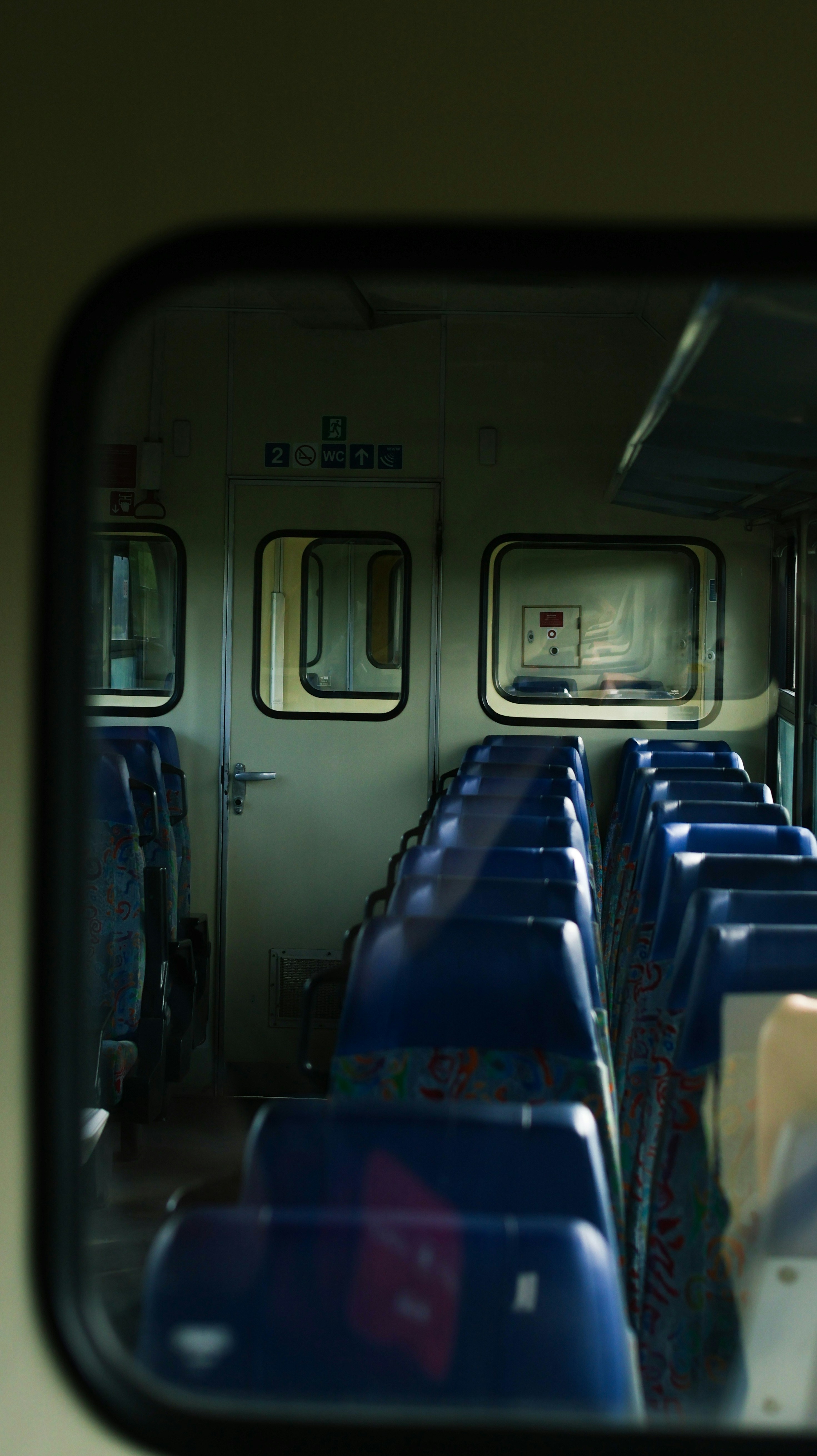 Mid-Platform Quiet: Interior of a Passenger Train