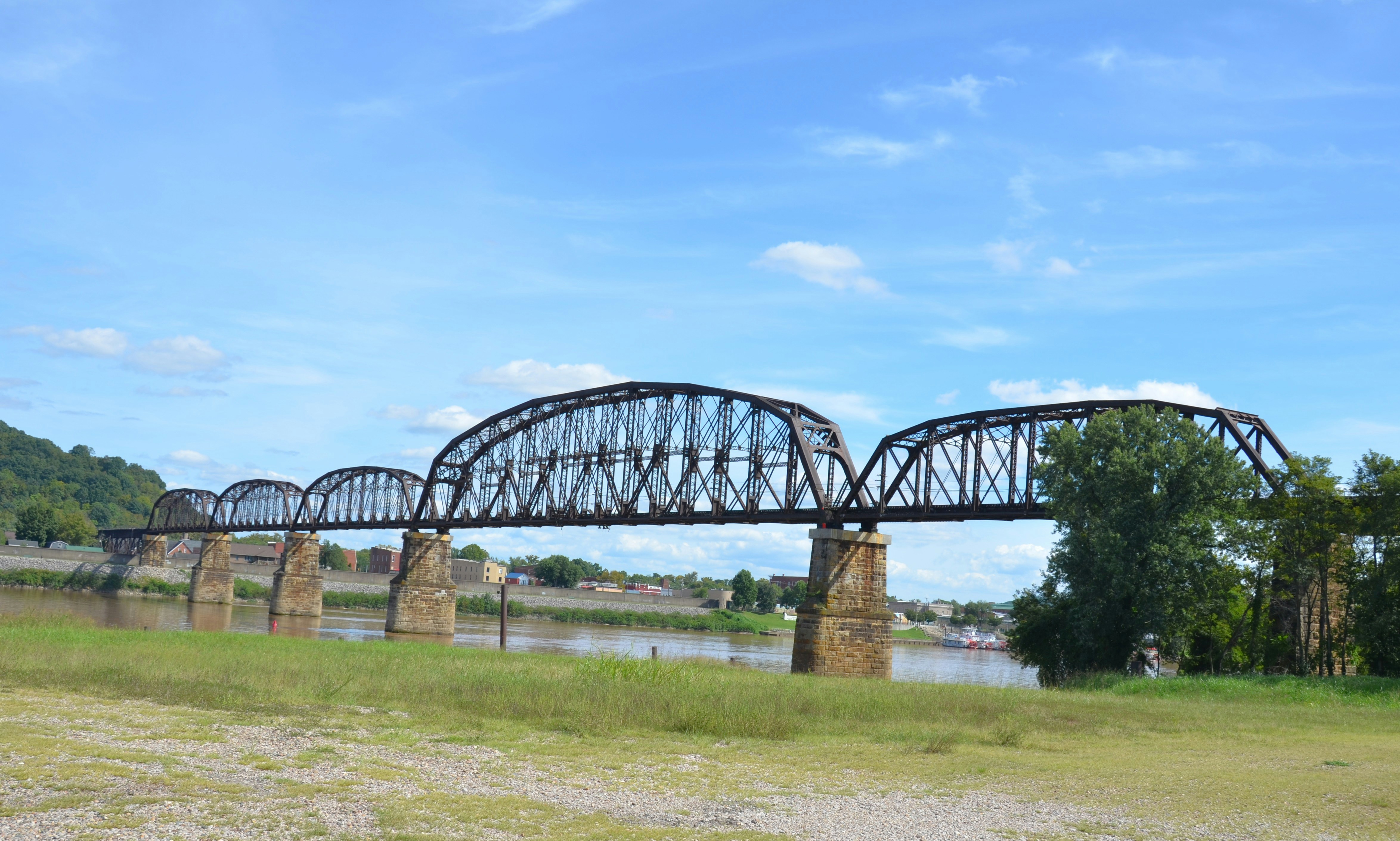 Steel Arc Over the River: A Quiet Riverside Crossing